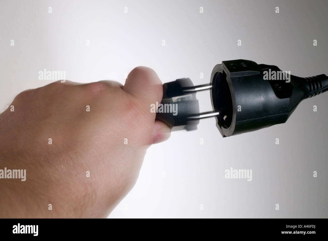 Hand pulling the plug Stock Photo - Alamy