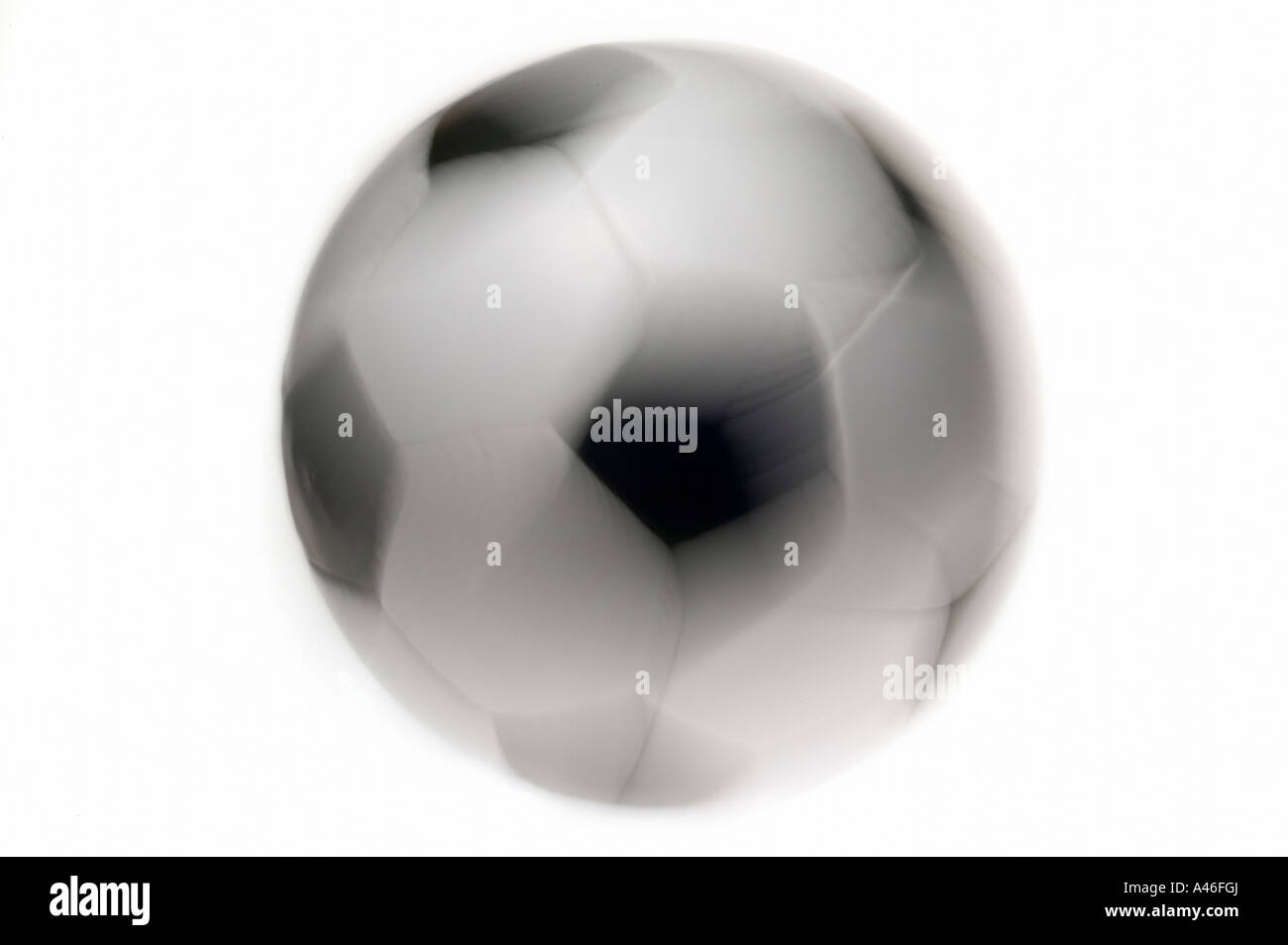 A moving soccer ball on white background Stock Photo - Alamy