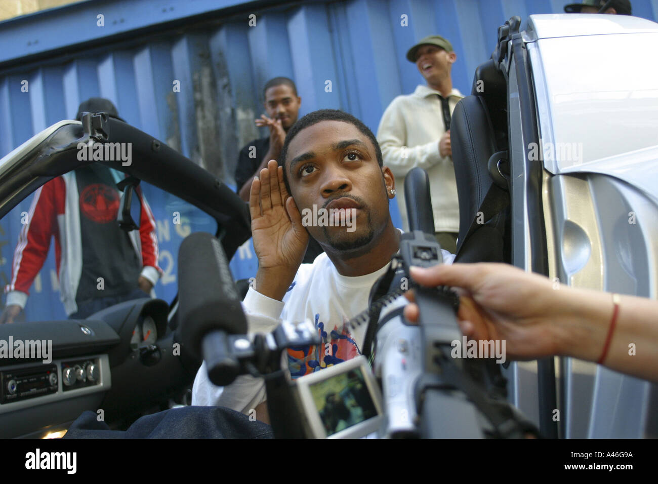 DJ Wylie and grime band Roll Deep Crew on the street in Hackney East ...