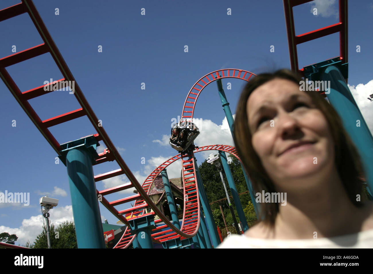 A visitor on the spinball whizzer ride at alton towers amusement park ...