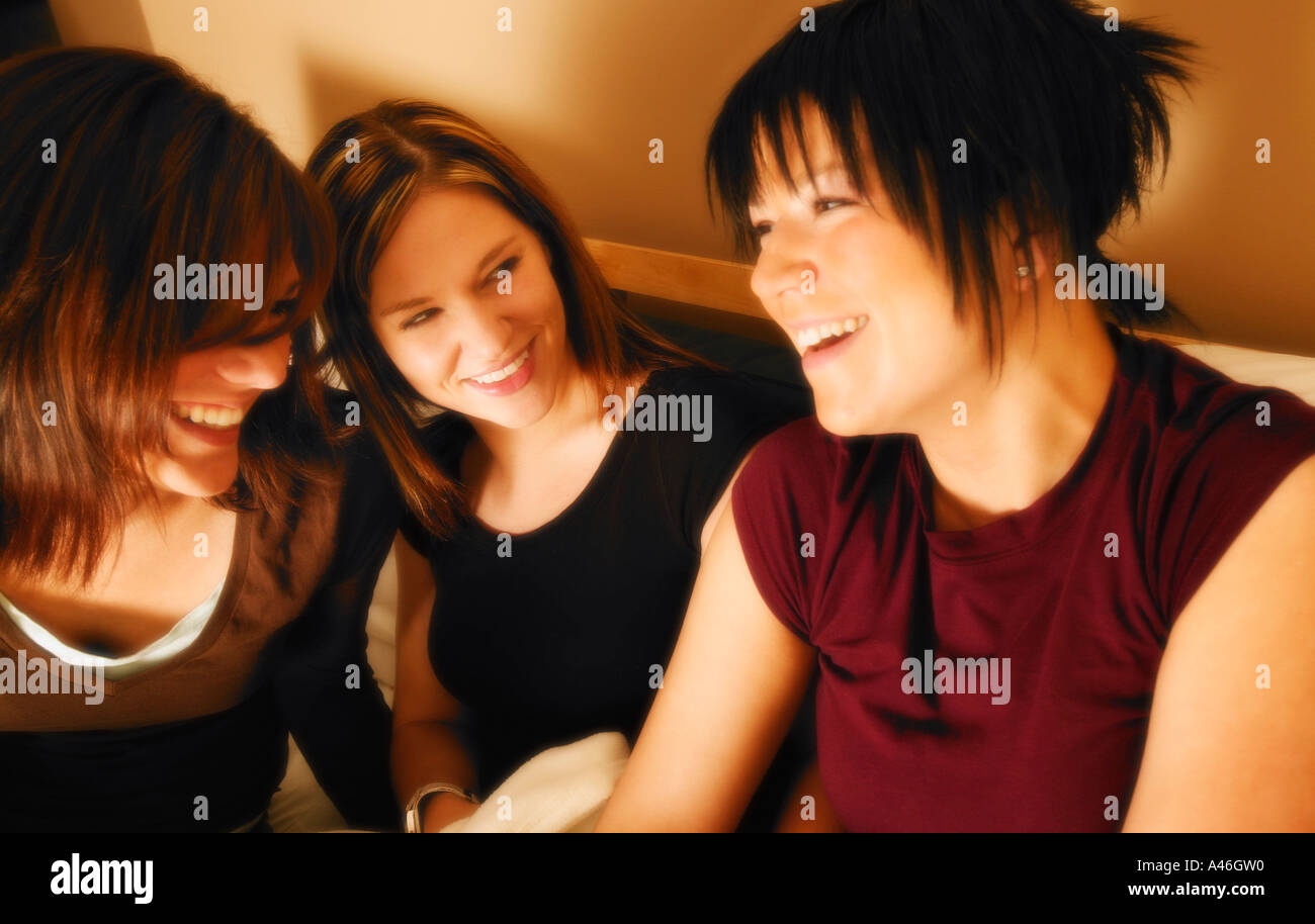 Group of girls laughing together Stock Photo - Alamy