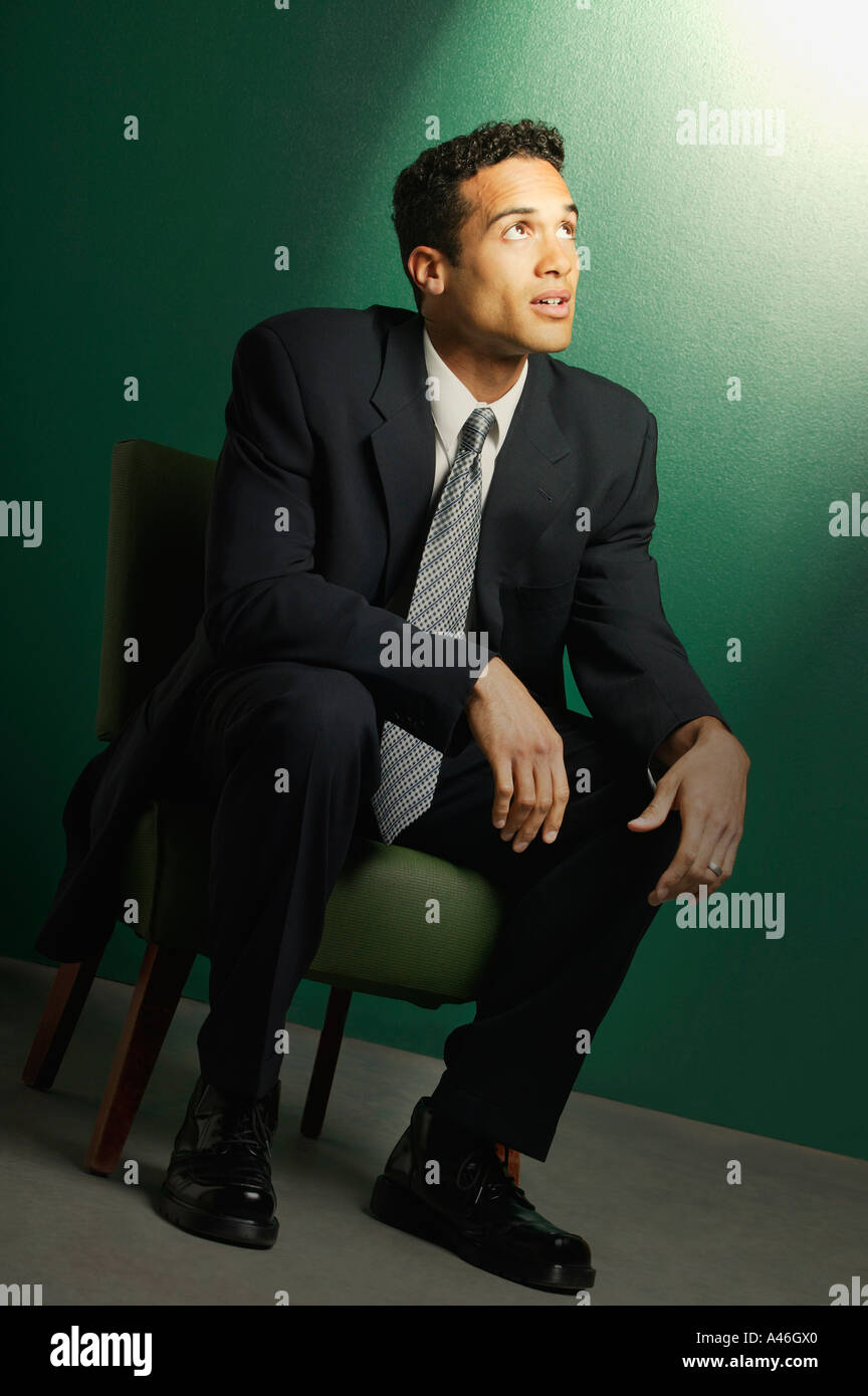 Man under a spotlight Stock Photo - Alamy