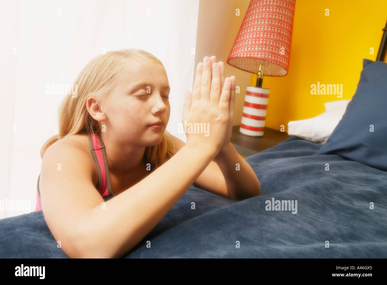 Child praying bedside hi-res stock photography and images - Alamy