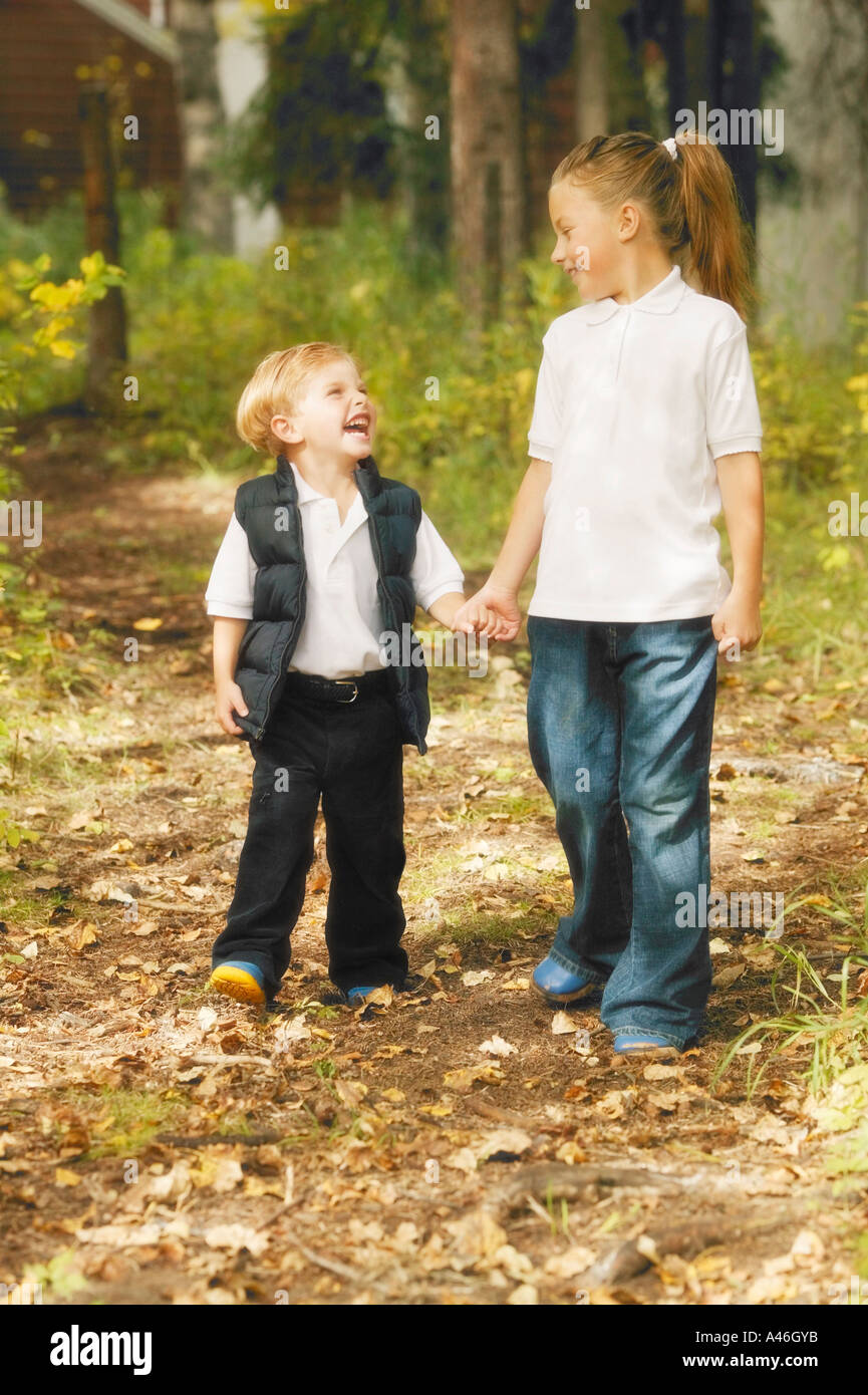 Children walking together Stock Photo - Alamy