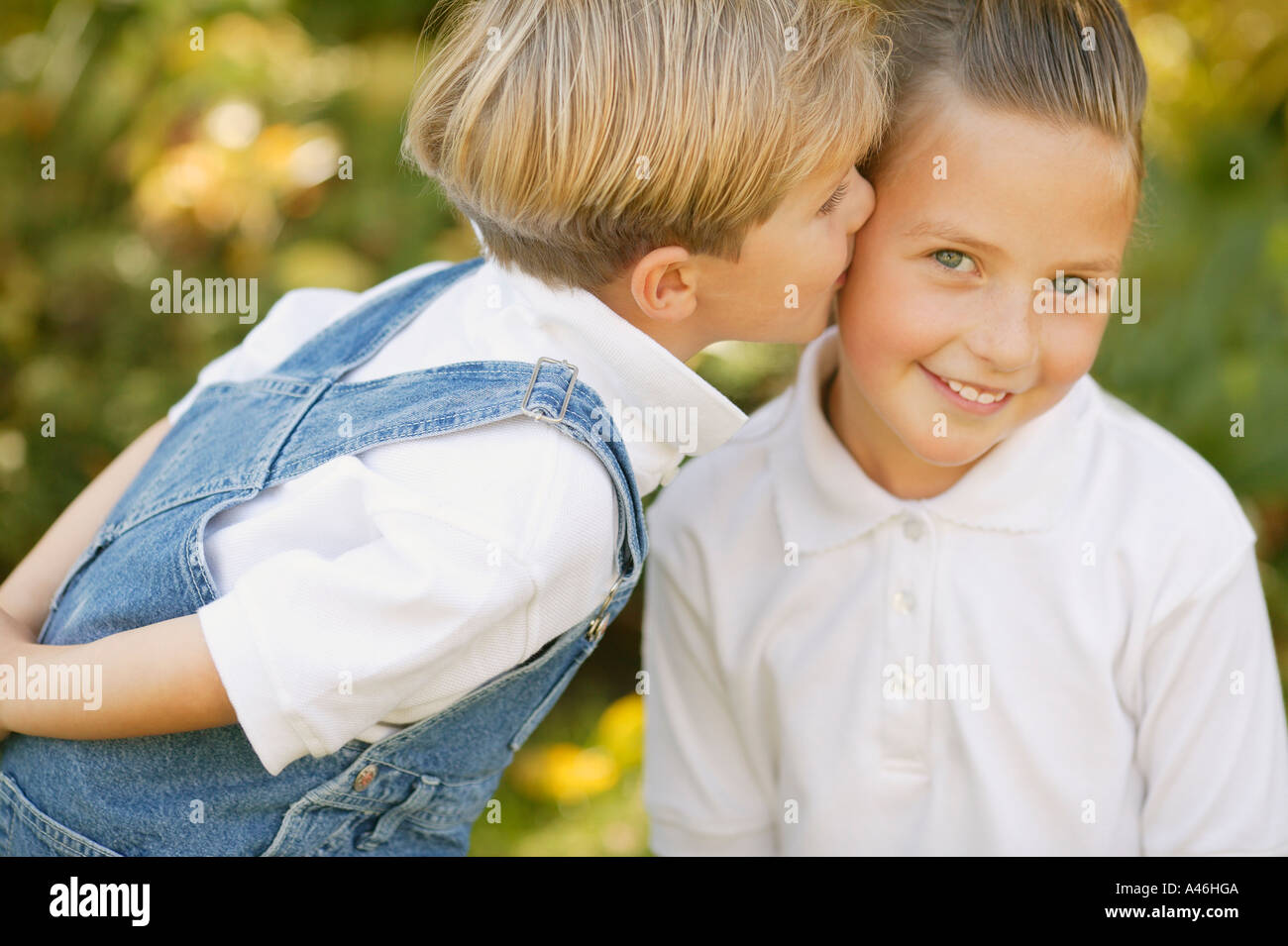 Two kissing brothers portrait hi-res stock photography and images - Alamy