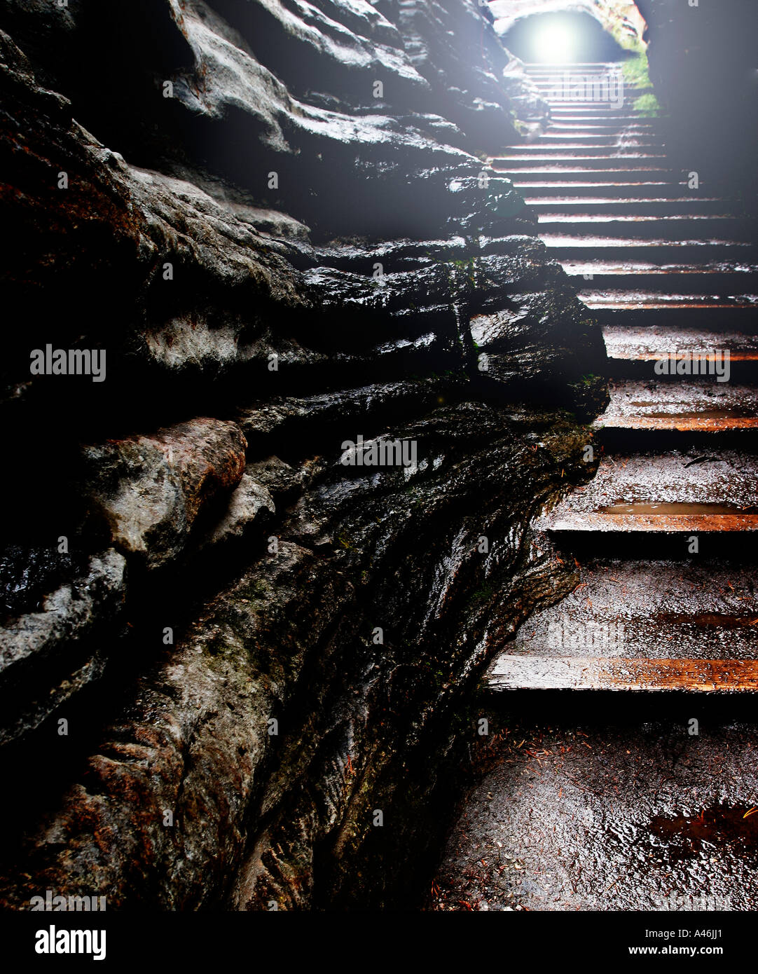 A staircase through a cave Stock Photo - Alamy
