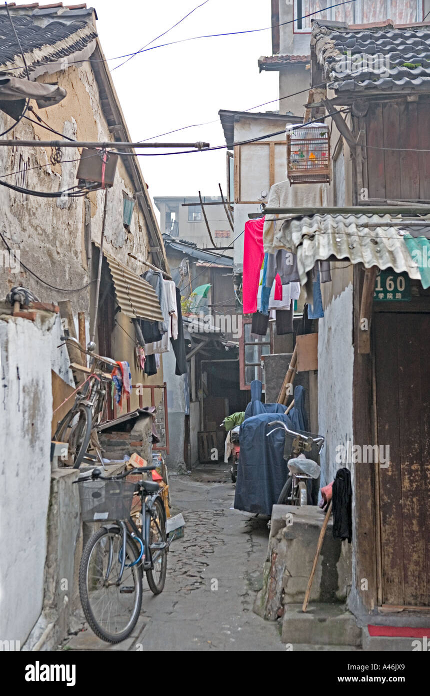 CHINA SHANGHAI Typical narrow alley in the old section of Shanghai with ...