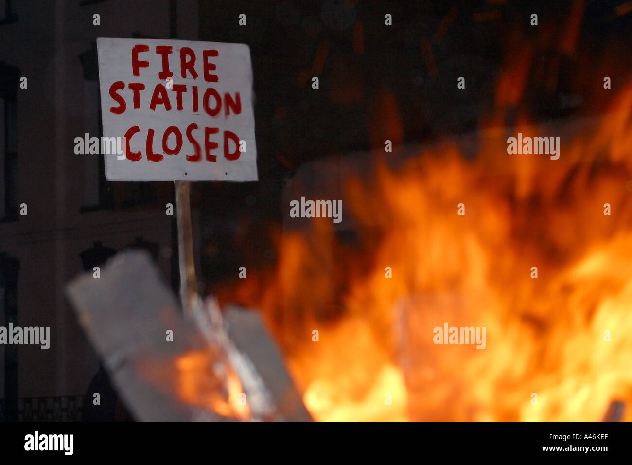 britsh firefighters strike a placard announces the closure of homerton ...