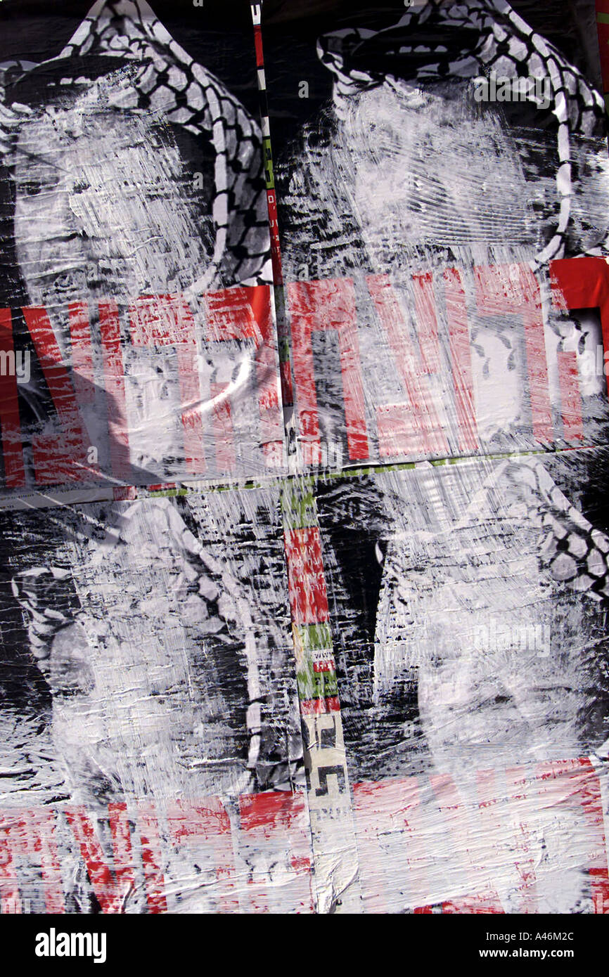 Posters calling PLO leader Yasser Arafat a murderer are defaced outside ...