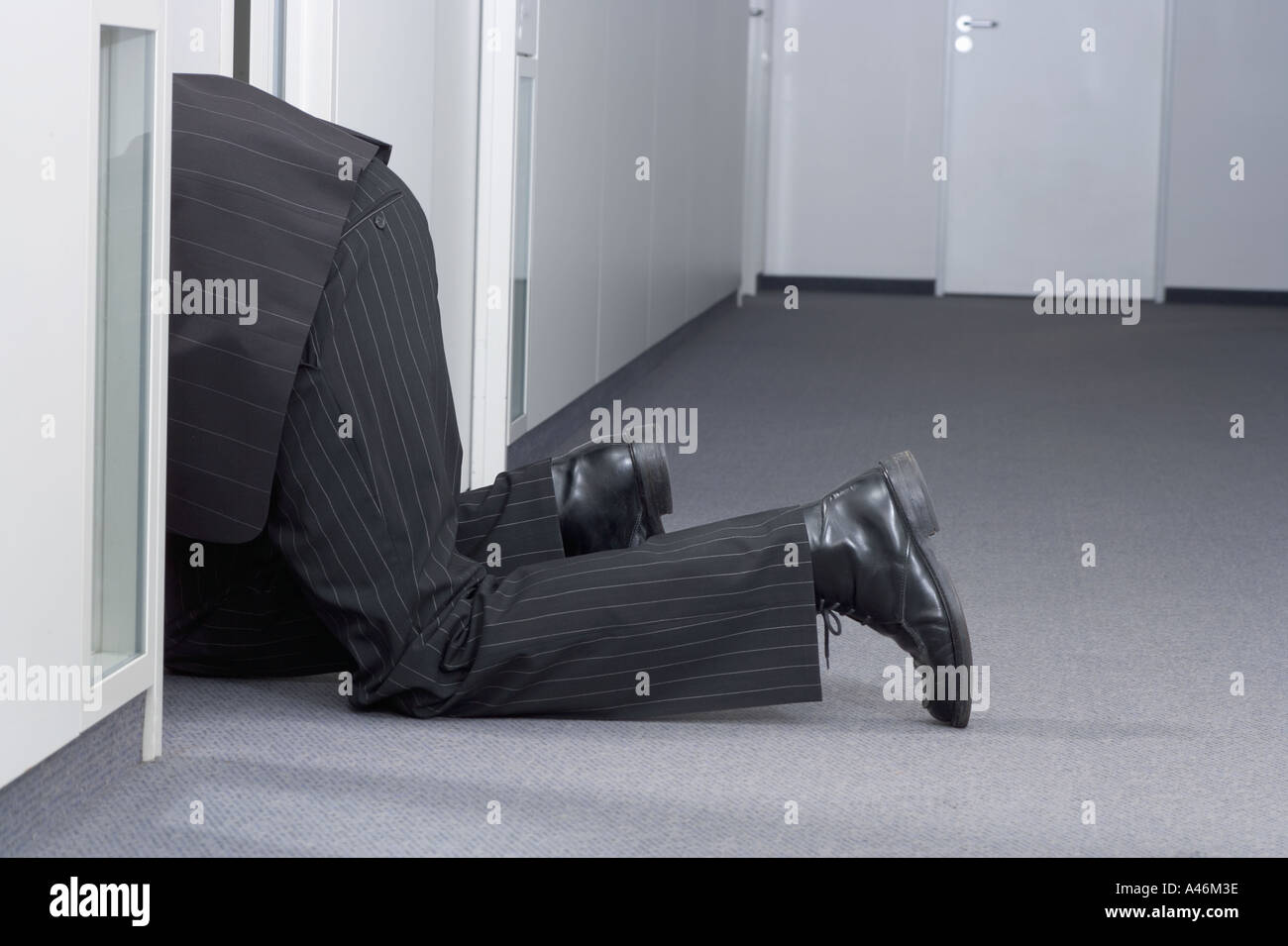 Businessman crawling on floor hi-res stock photography and images - Alamy