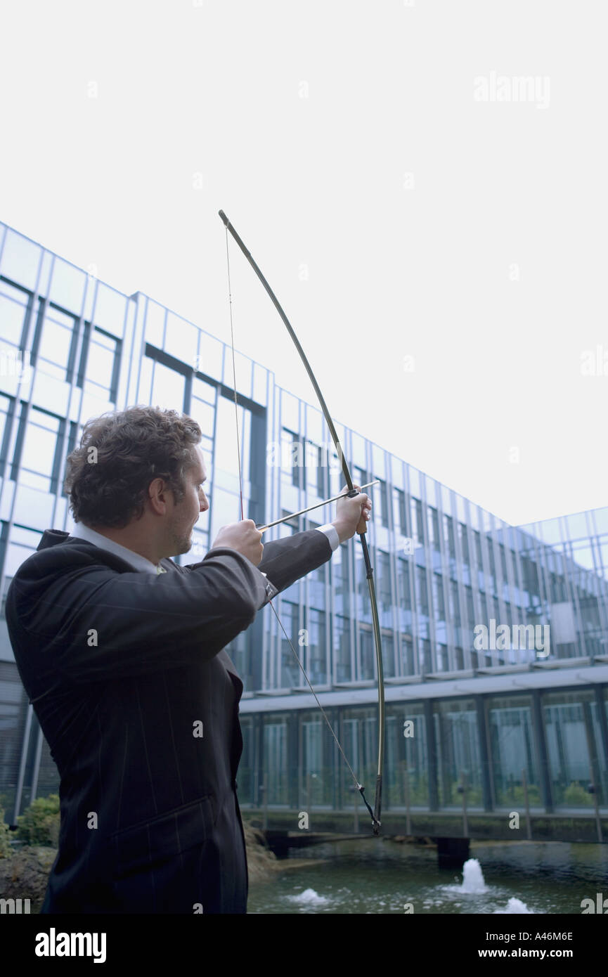 Man using bow arrow hi-res stock photography and images - Alamy