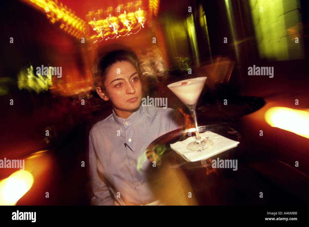 A waitress in the cocktail lounge of the Atlantic Bar, a members only ...