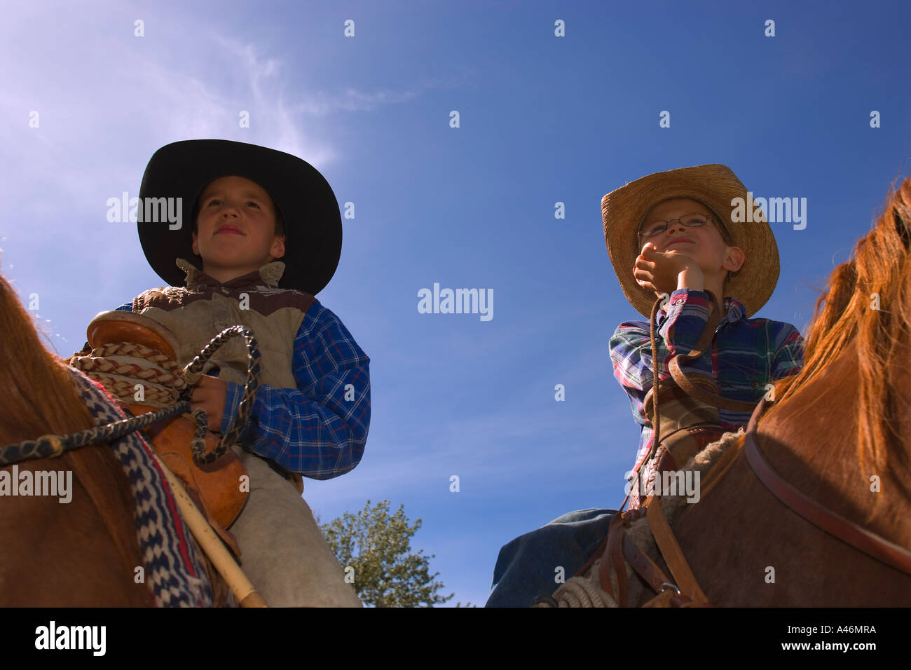 Two cowboys together horse hi-res stock photography and images - Alamy