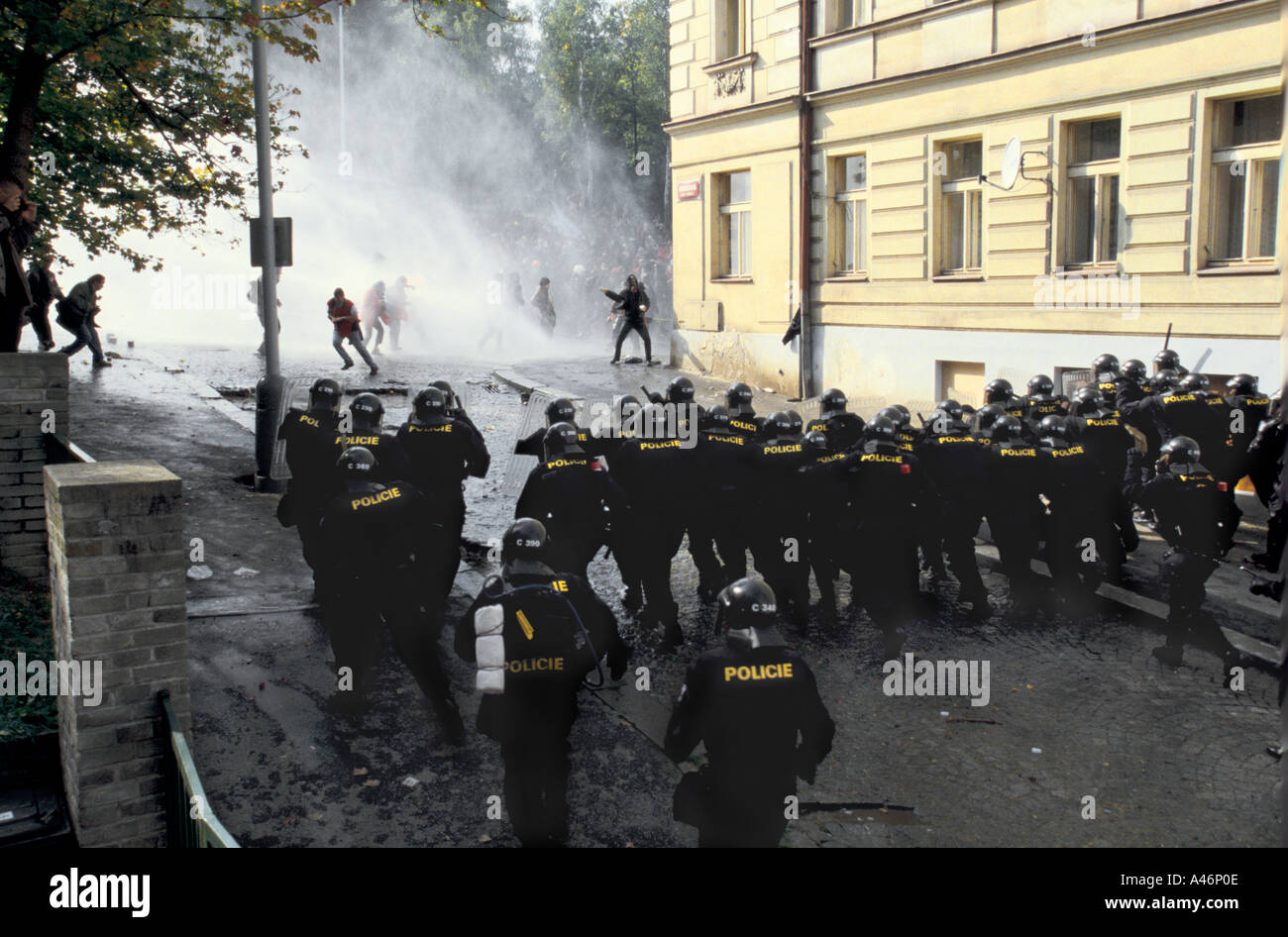 police charge with water cannon at anti globalisation riots at the 55th ...