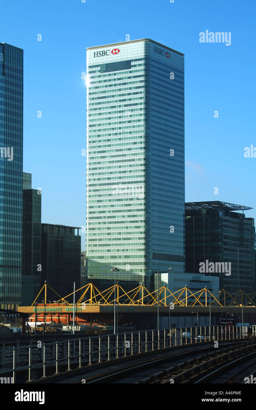 Canary Wharf HSBC bank HQ office building with Billingsgate fish market below in foreground ...