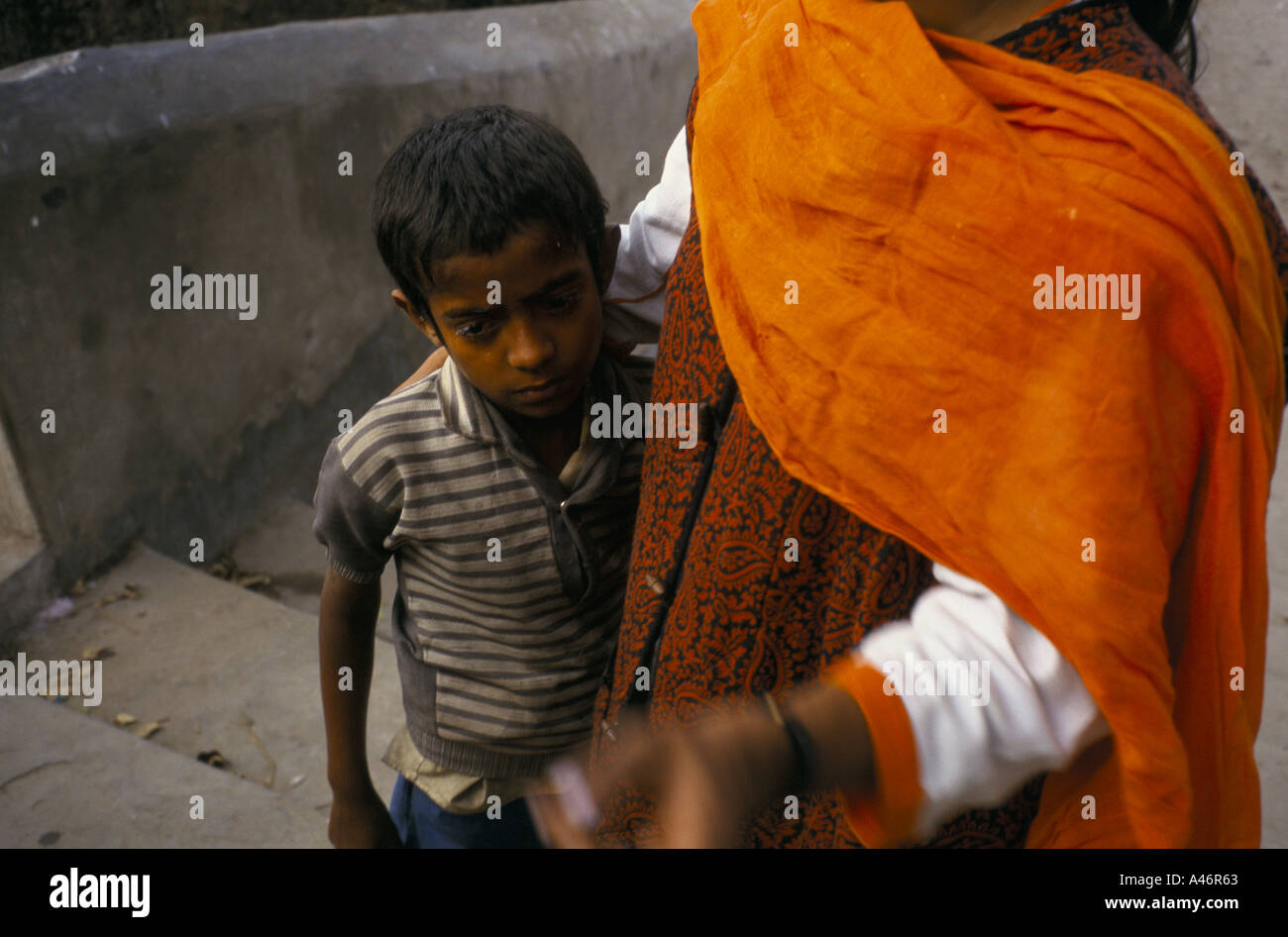 street child with a social worker new delhi india Stock Photo - Alamy