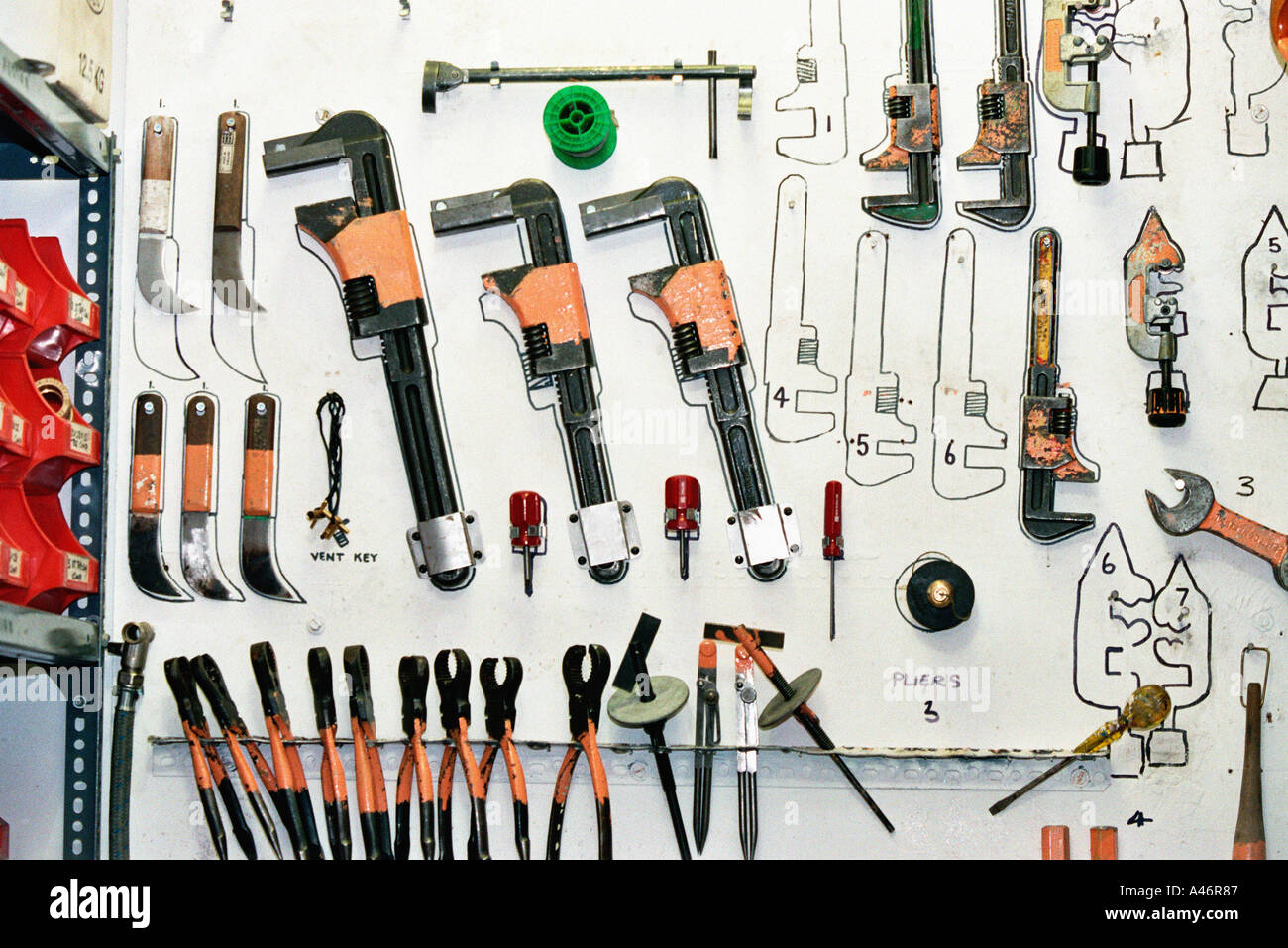 Tools on wall Stock Photo - Alamy