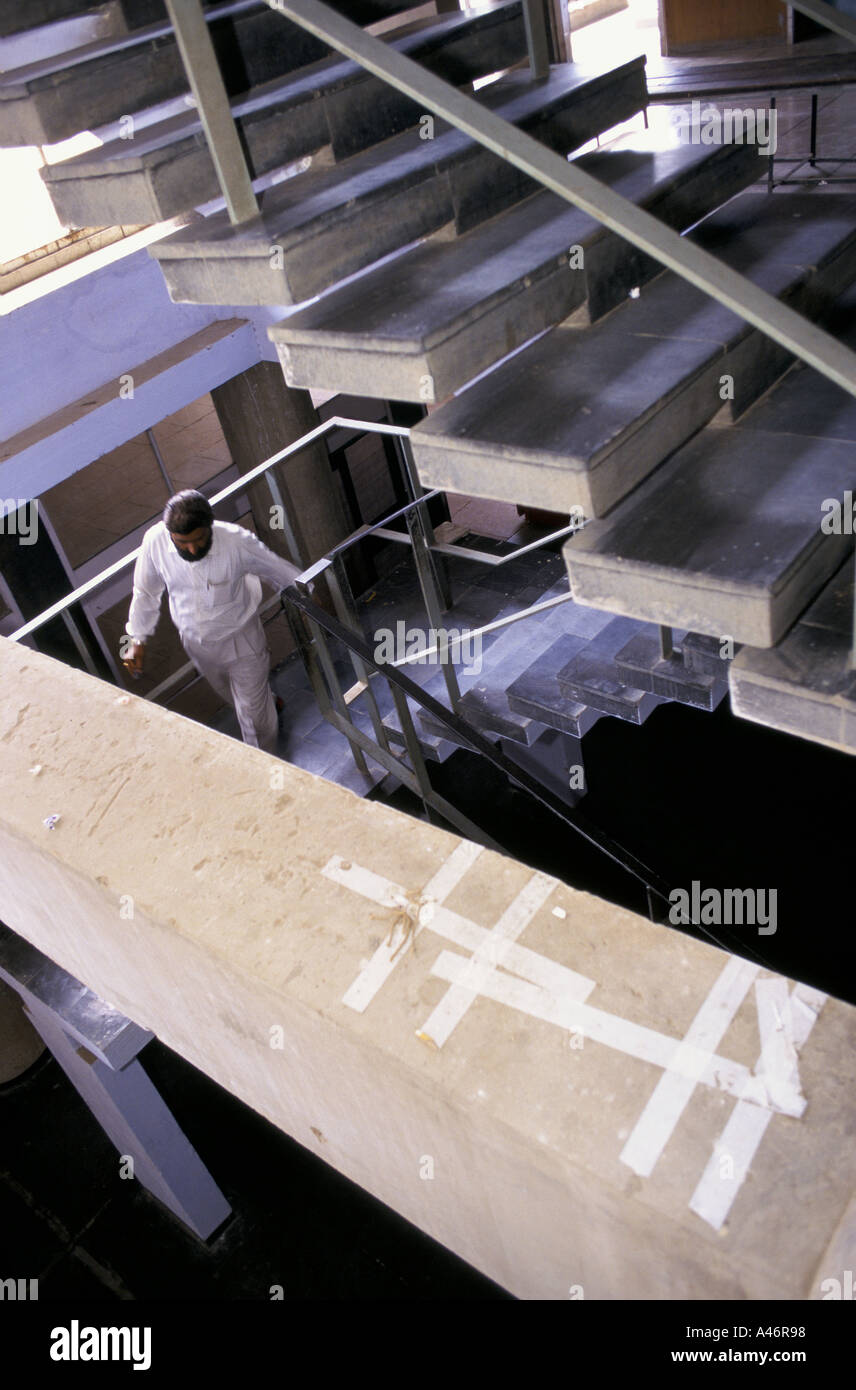 A man climbs the stairs inside the University building in Chandigarh ...