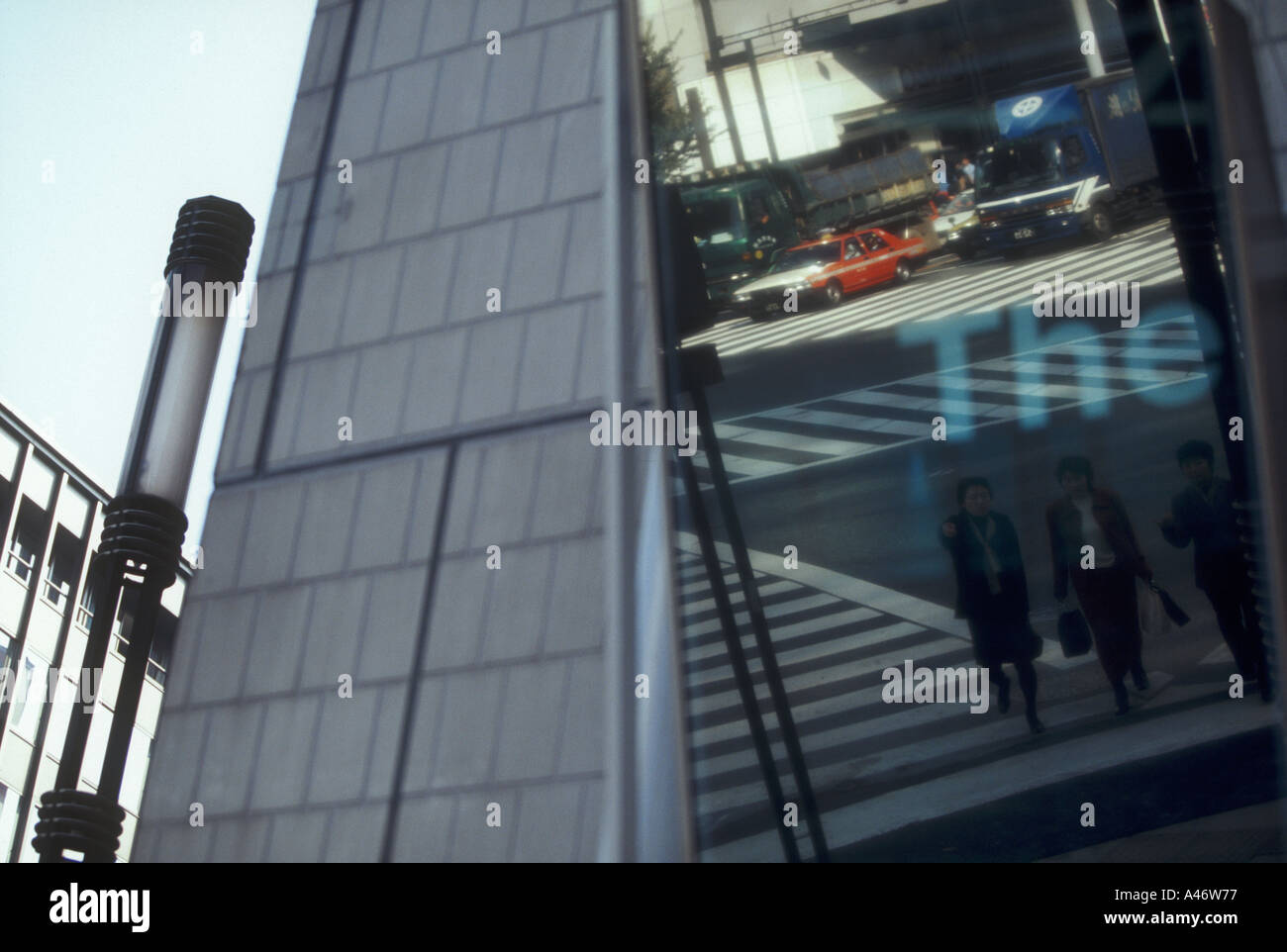 office workers in tokyo reflected in an office window tokyo japan Stock ...
