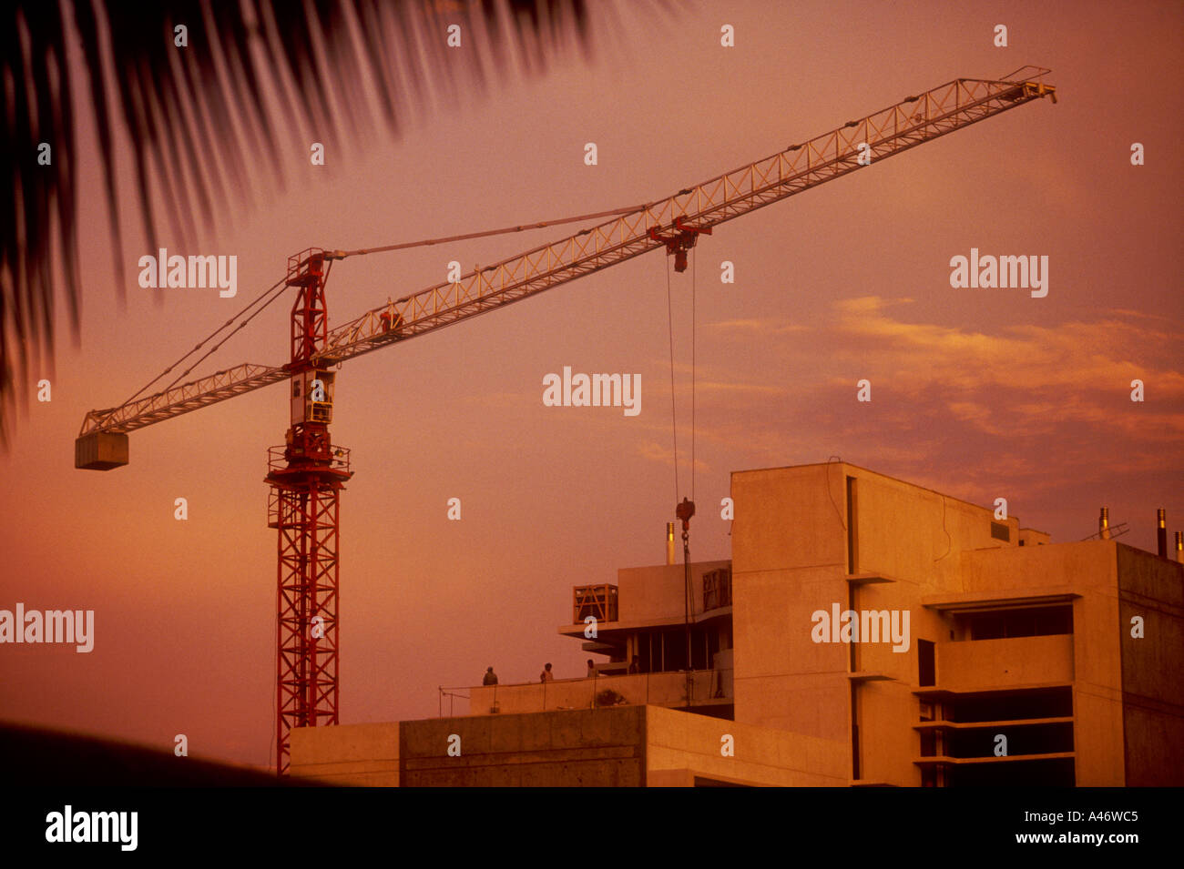 A crane doing new building work in Luanda, Angola. The city is starkly ...