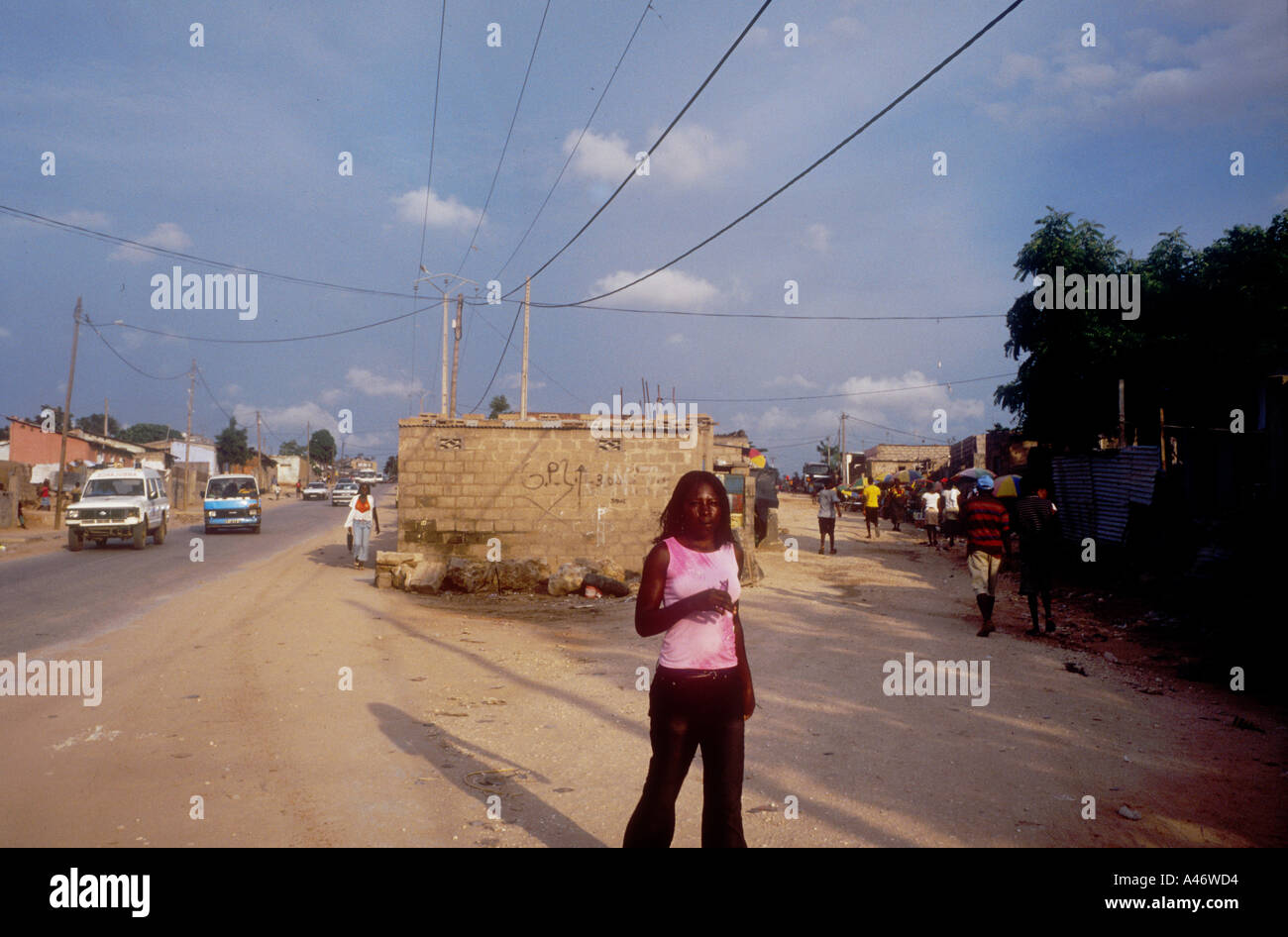A woman walks through the slum area of Prenda, Luanda, Angola Stock ...