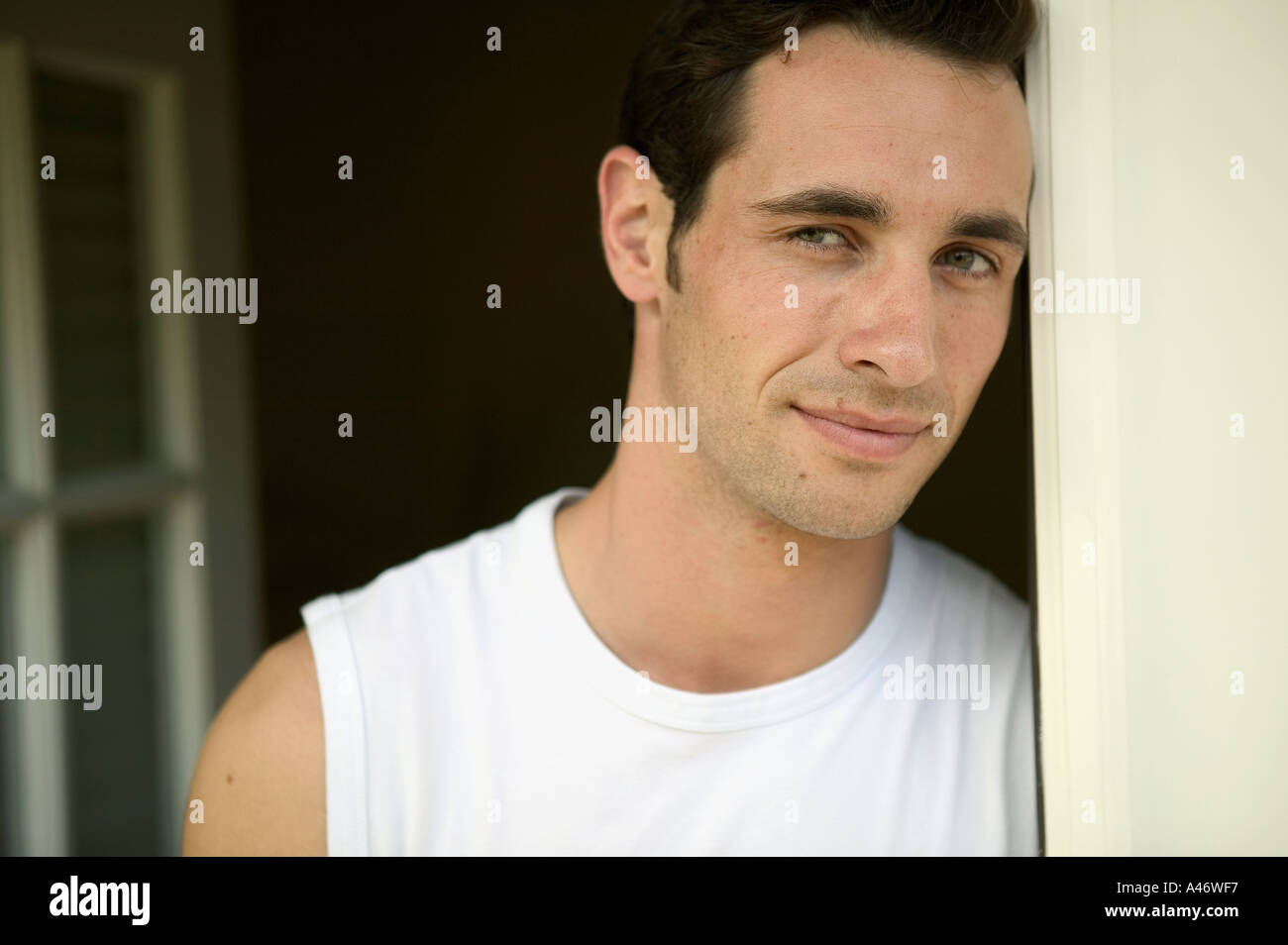 Standing man in sleeveless hi-res stock photography and images - Alamy