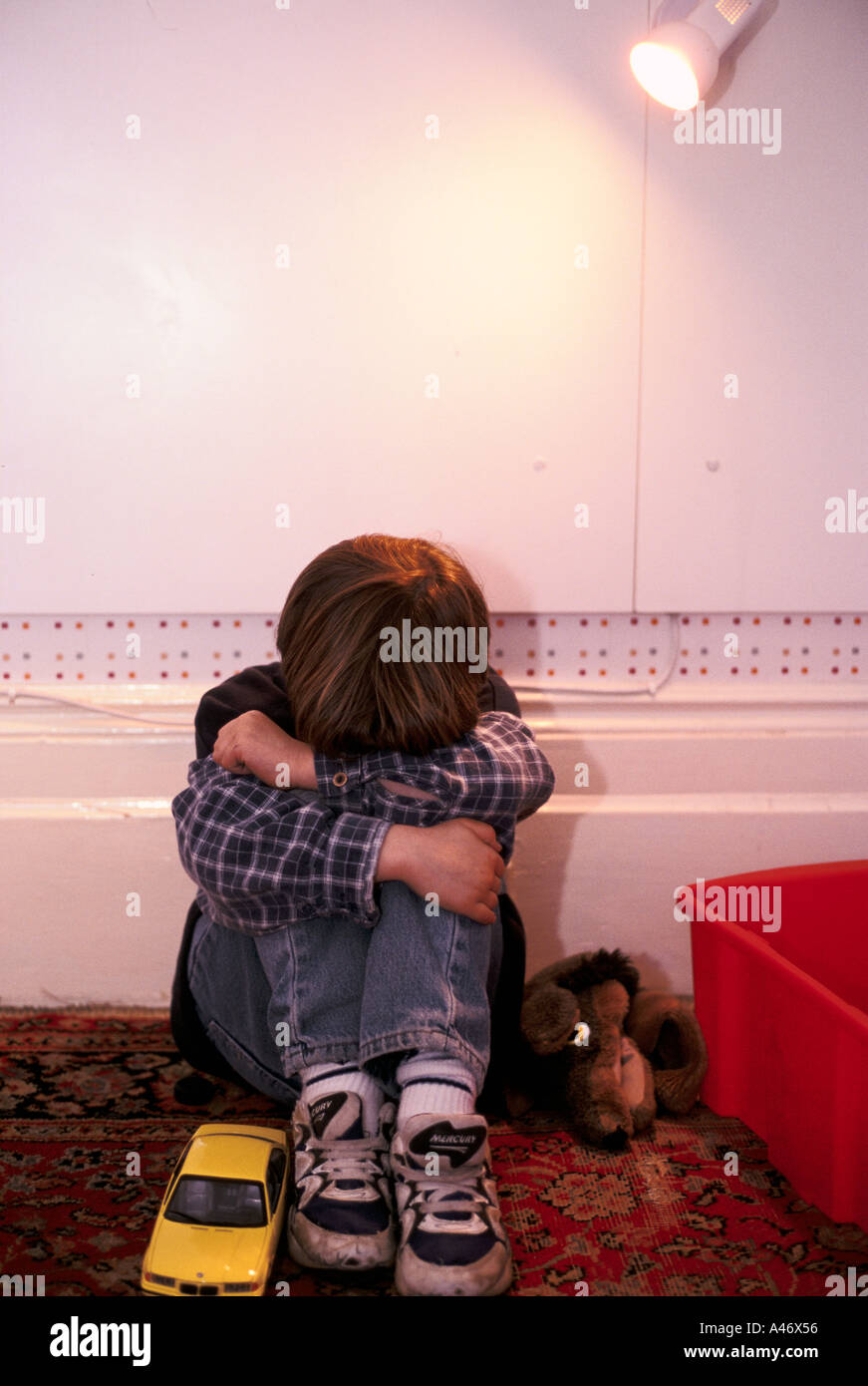 An image of a frightened child illustrating child abuse and cruelty ...