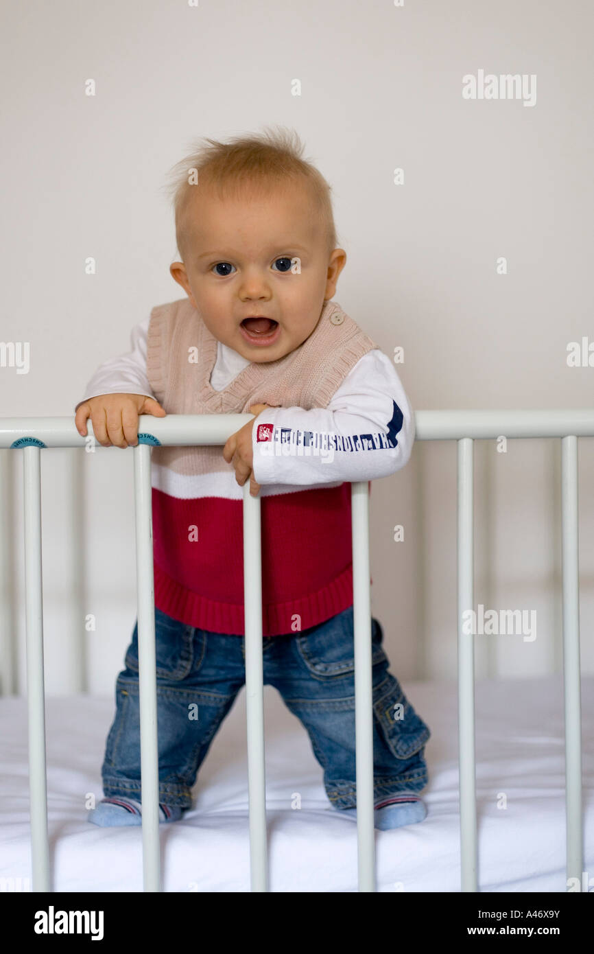 Standing indoors playful pose hi-res stock photography and images - Alamy