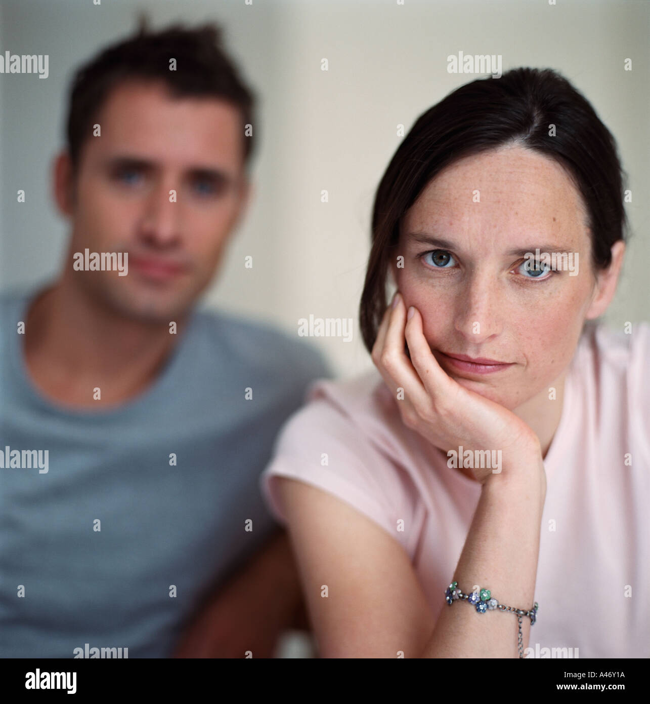 Serious looking couple Stock Photo - Alamy