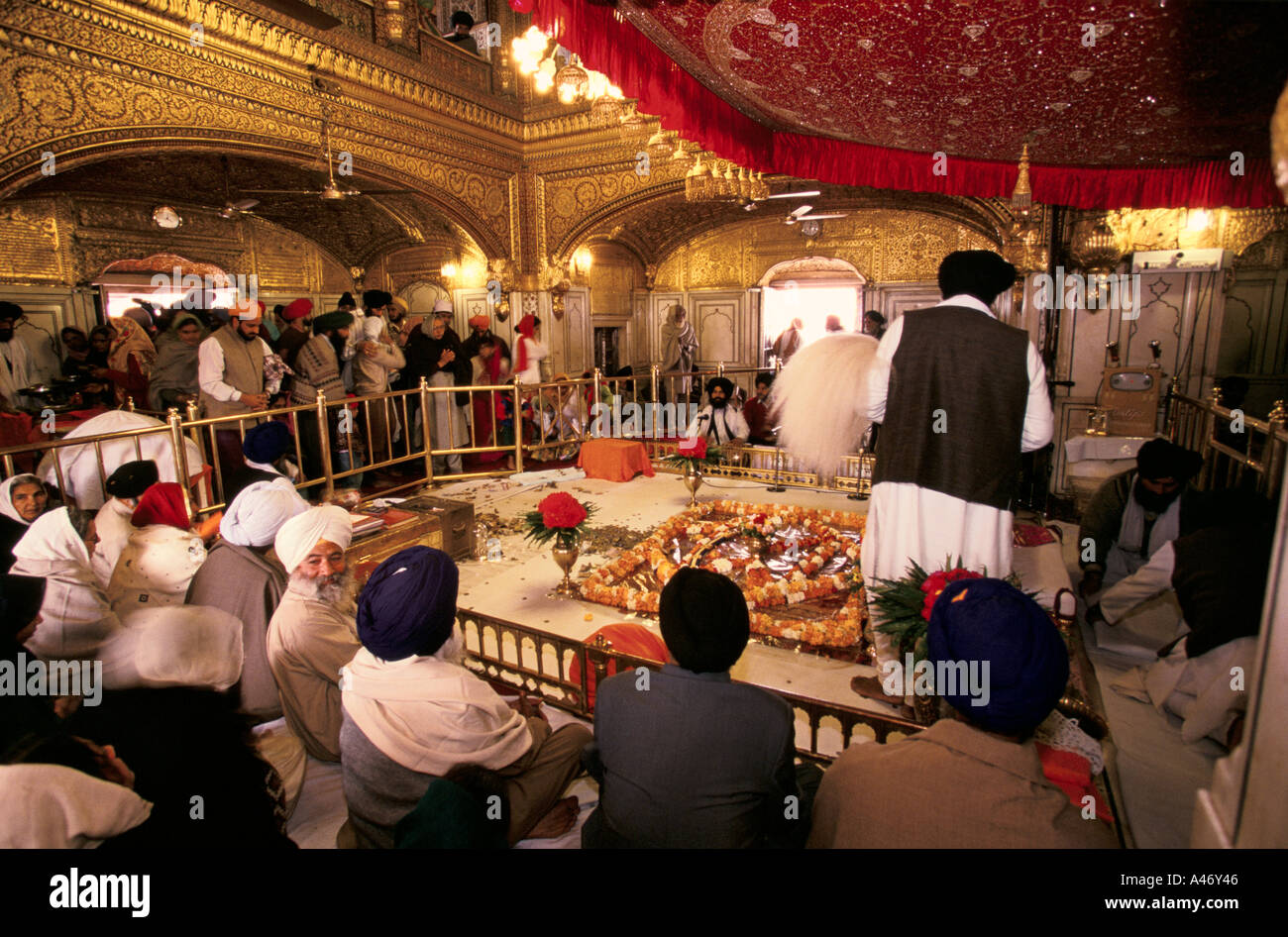 reading from the shri guru granth sahib the sikh holy text golden ...