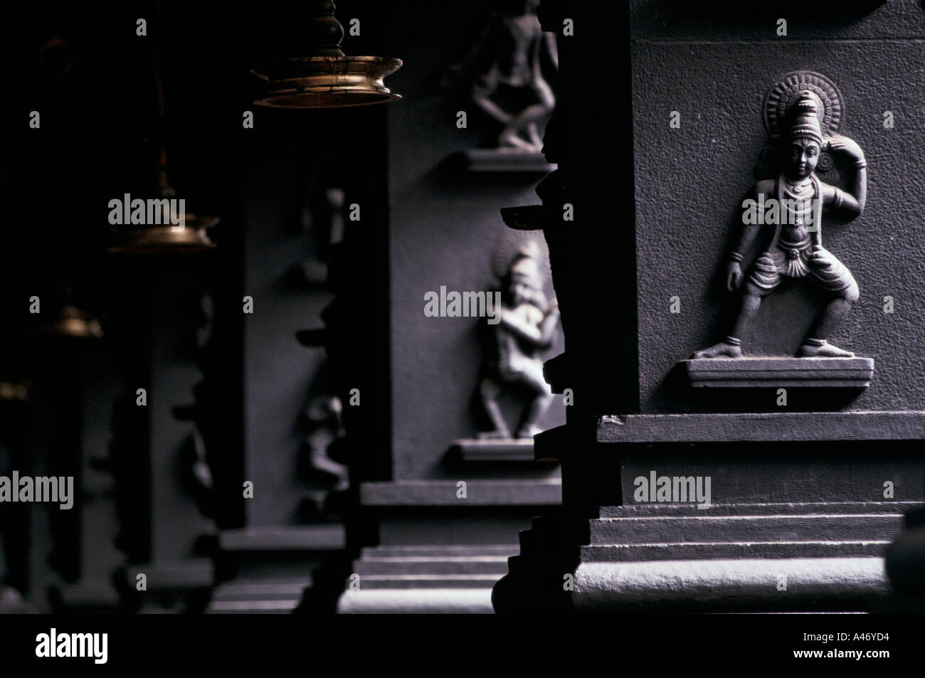 Carved pillars at the Koothambalam temple theatre at The Kerala ...