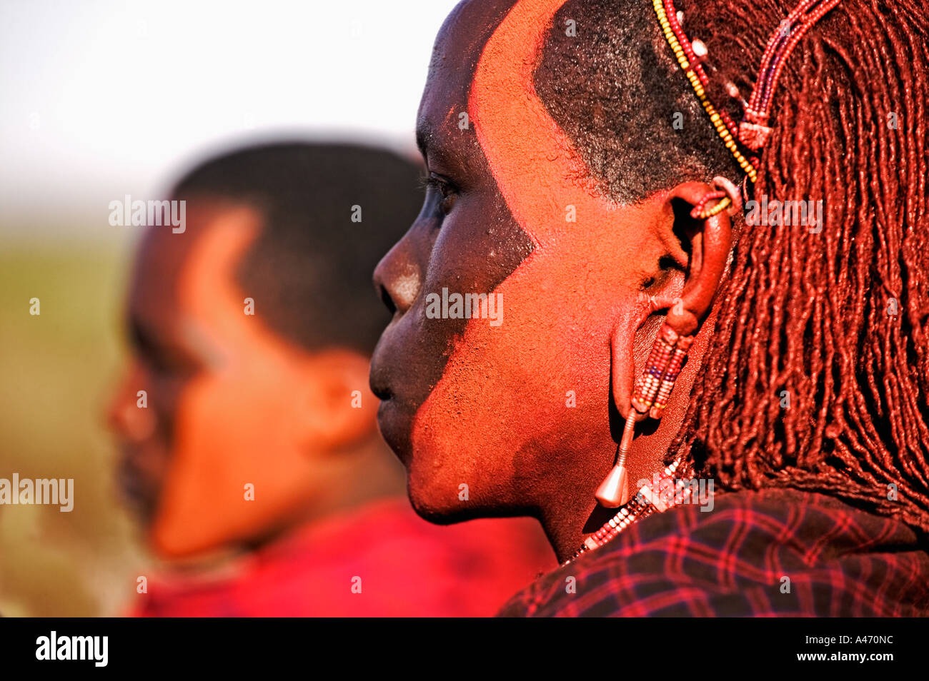 Maasai Men commonly mix ochre and oil to color hair and skin red Model ...