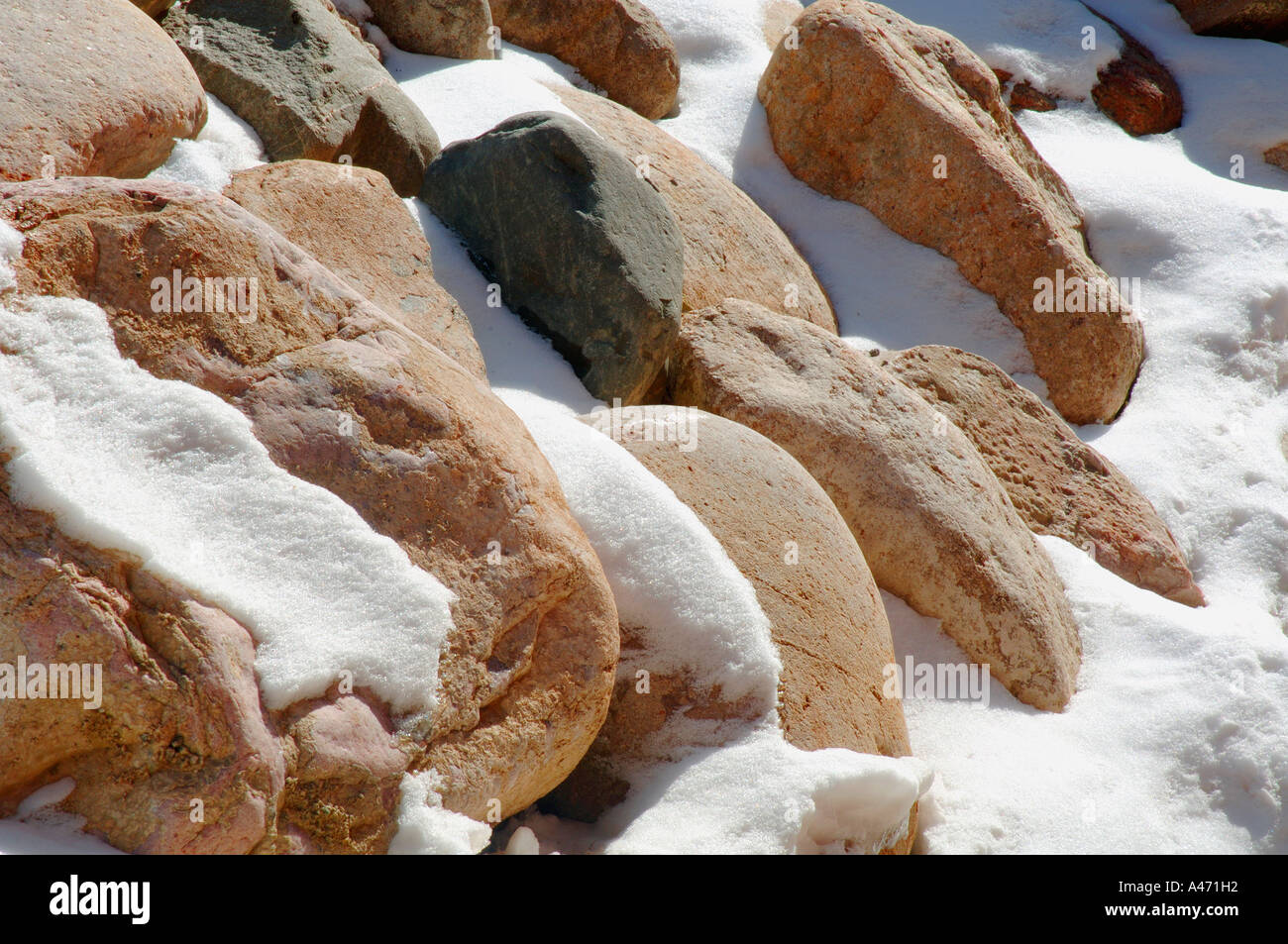 Rocks and snow Stock Photo - Alamy