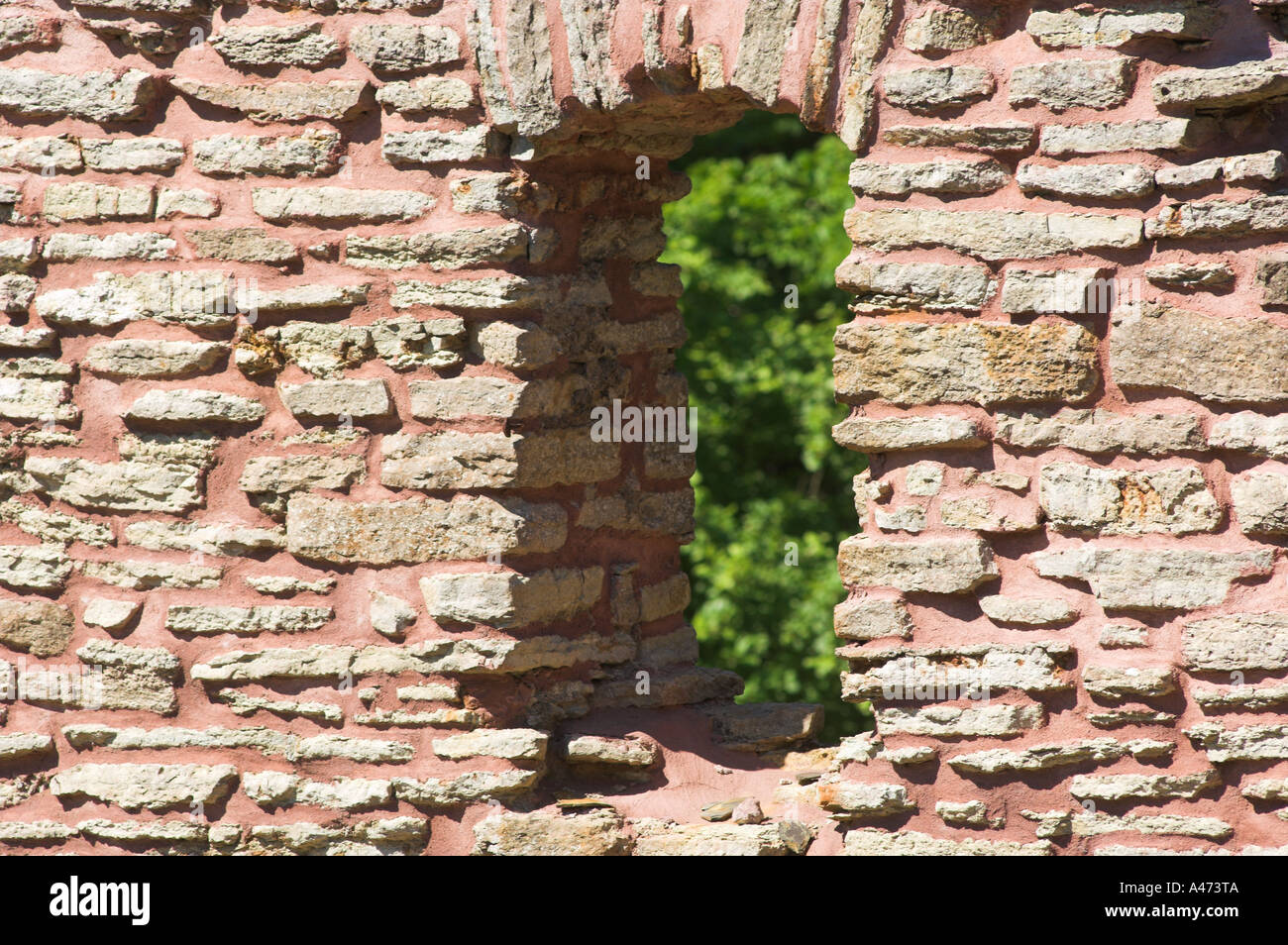 Opening in old wall Stock Photo - Alamy