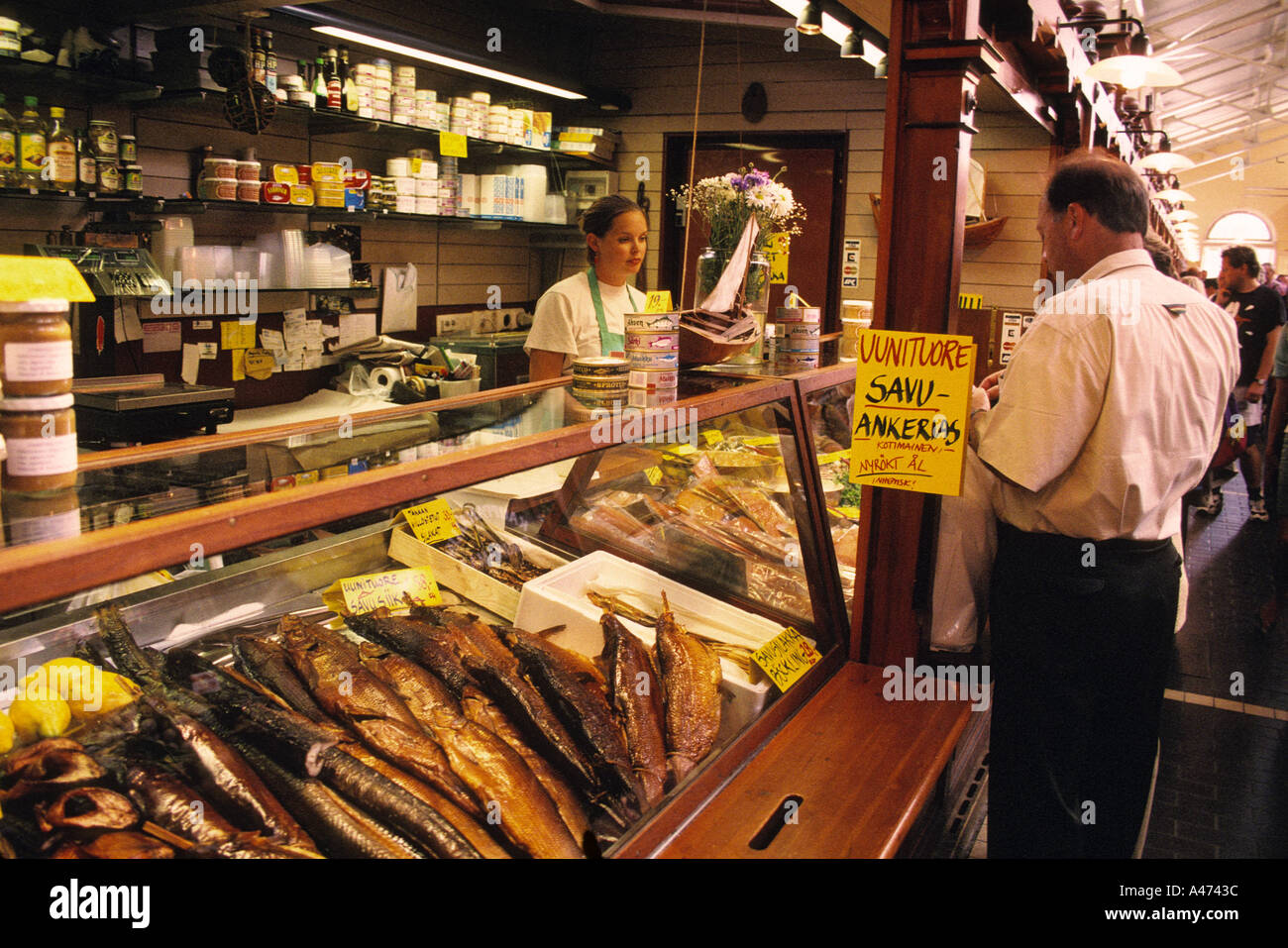Finland Helsinki Old Market Hall smoked fish seller Stock Photo - Alamy