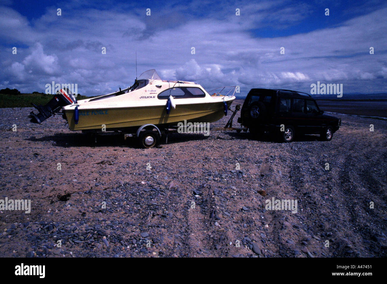launching a small boat Stock Photo - Alamy