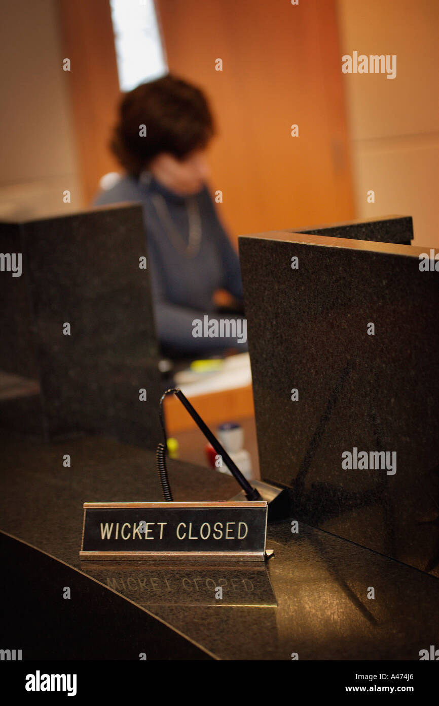 Woman bank inside teller hi-res stock photography and images - Alamy