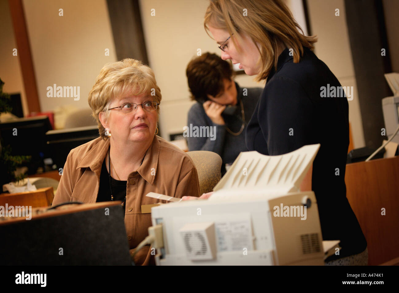 Women at work Stock Photo - Alamy