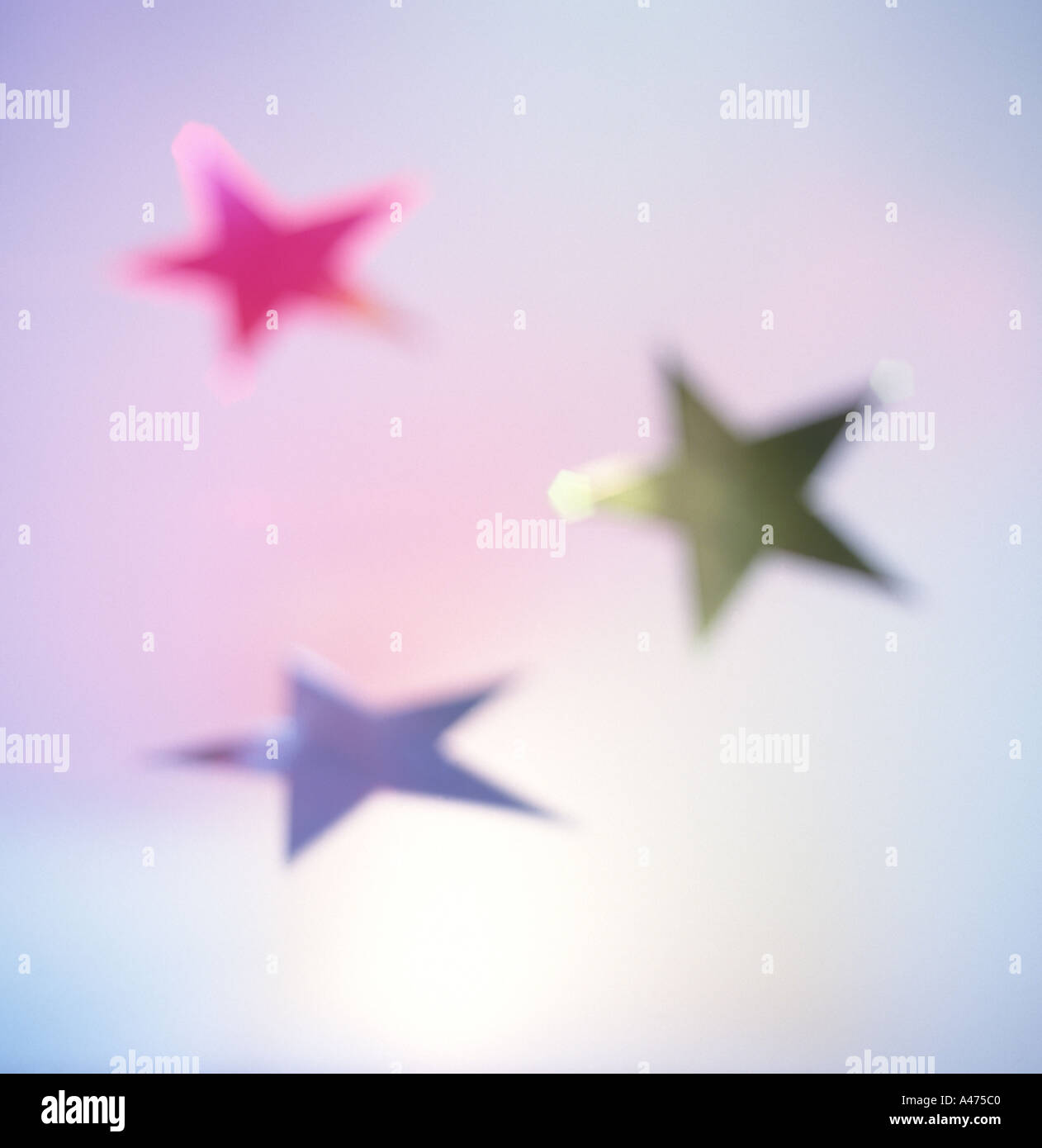 Three coloured stars Stock Photo - Alamy
