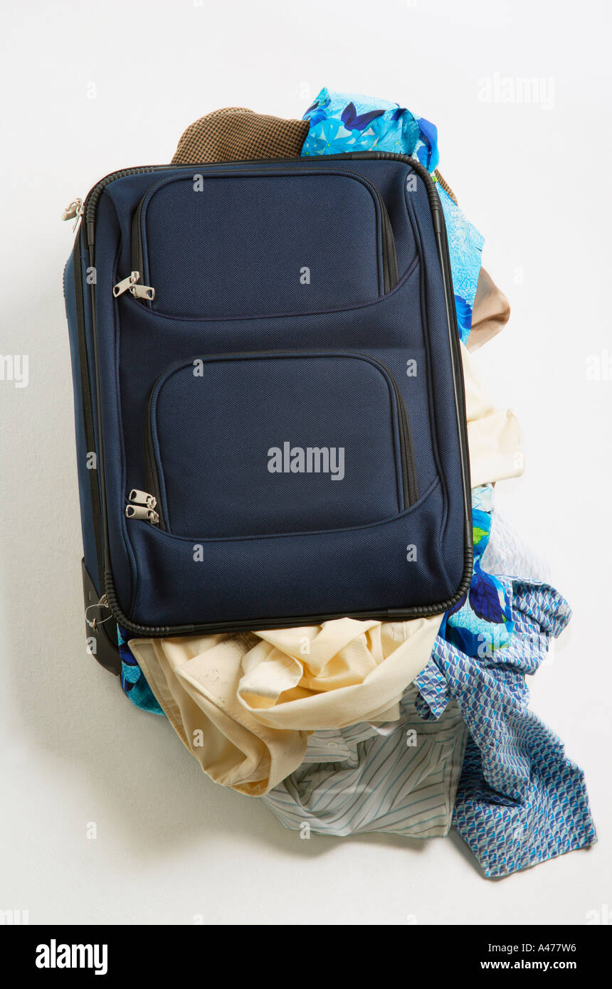 An over stuffed suitcase Stock Photo - Alamy