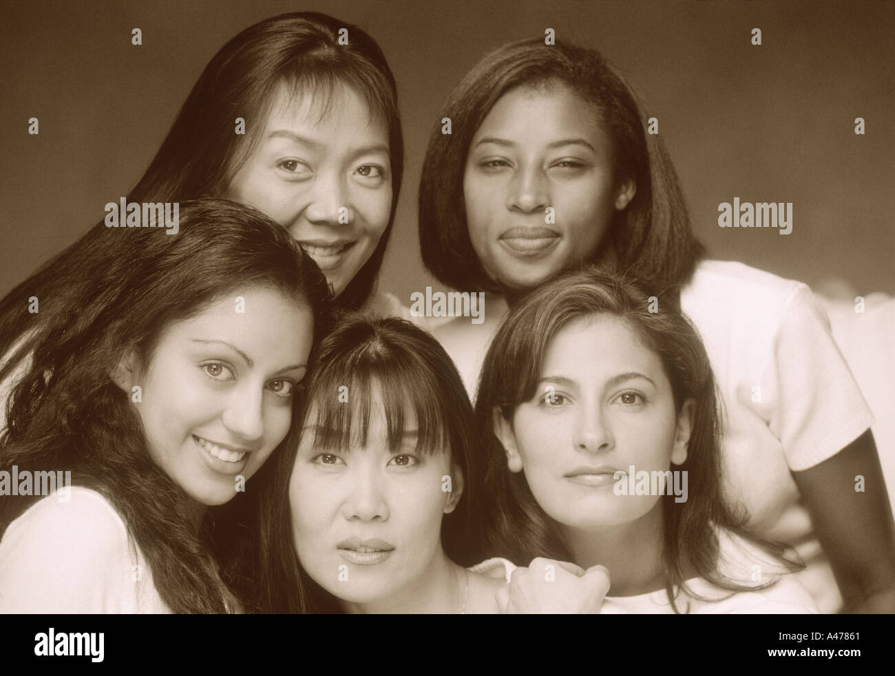 Five beautiful women and four different races Stock Photo - Alamy