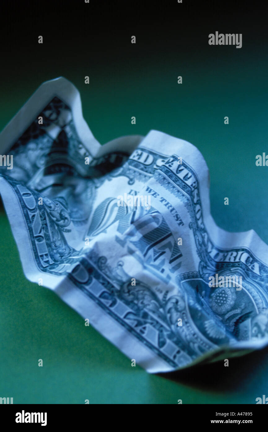 A crumpled US dollar showing the decline in the value of the US dollar ...