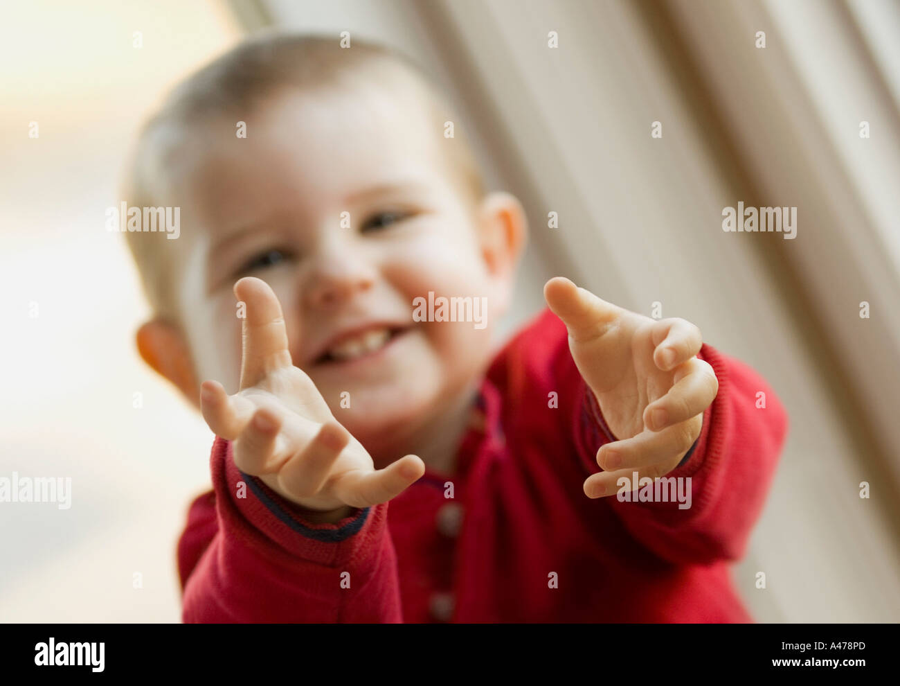 Child reaching out Stock Photo - Alamy
