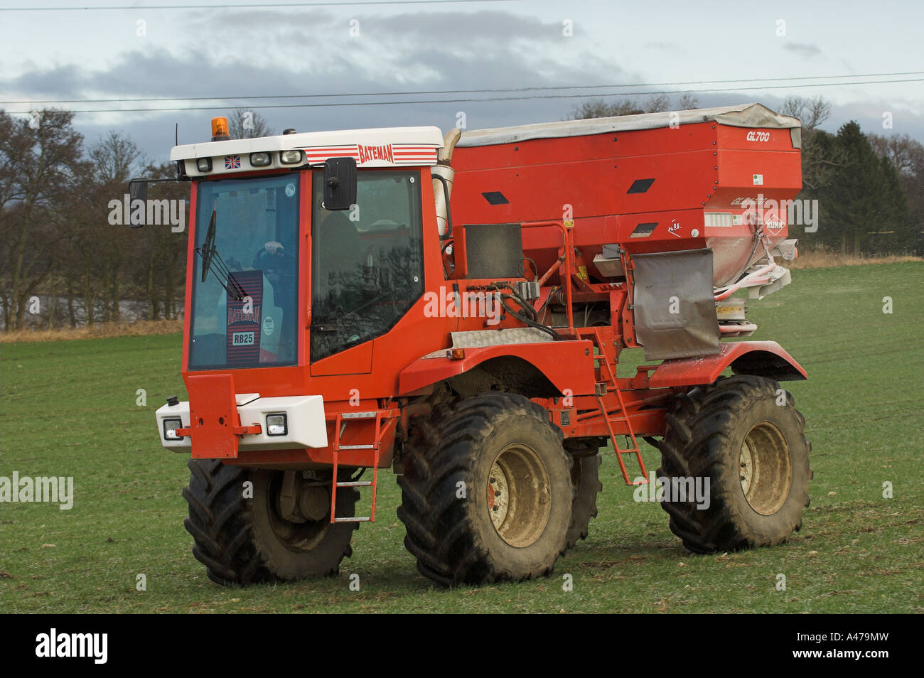 Self propelled fertiliser spreader applying Potash to reseeded meadow ...