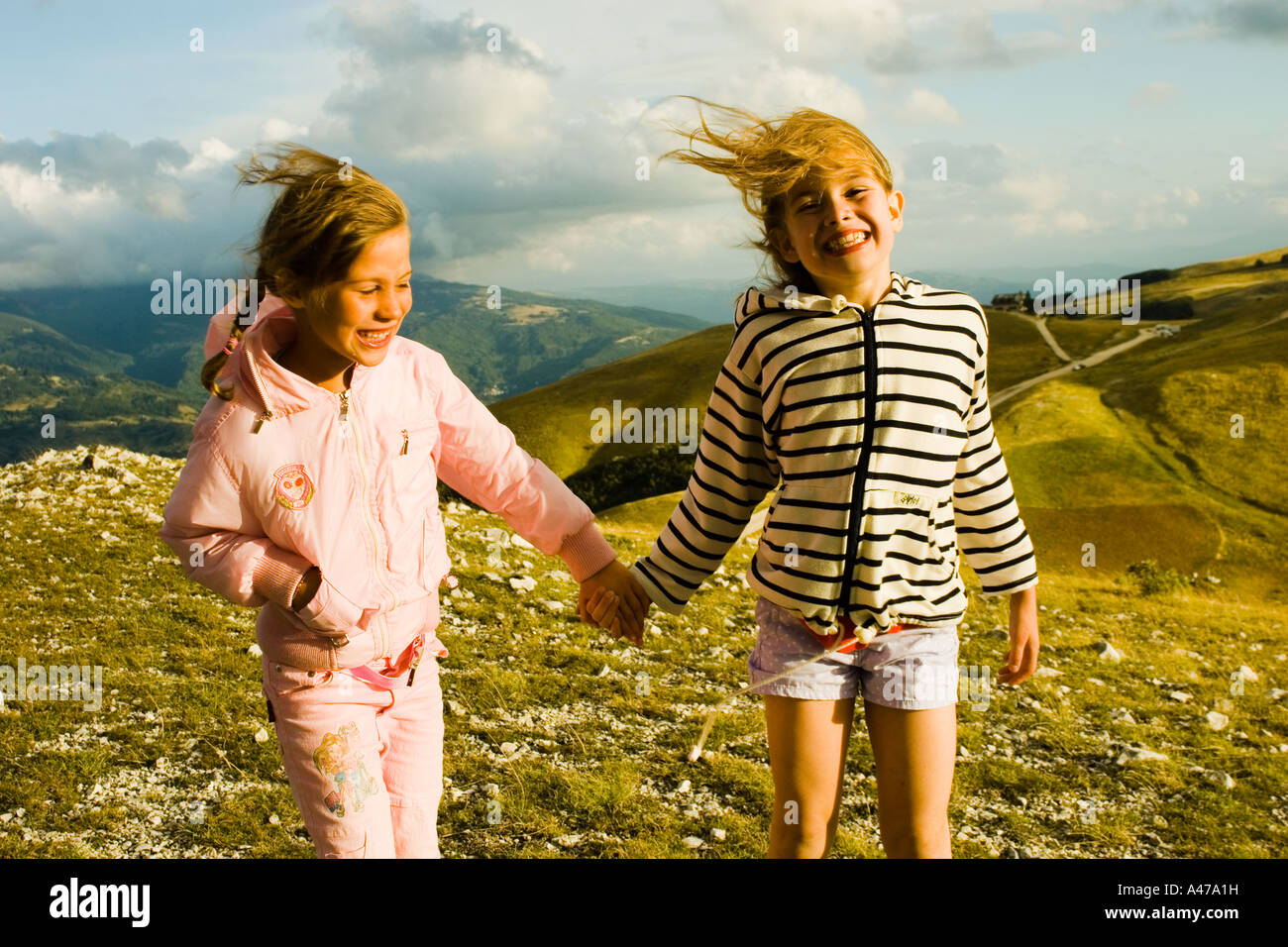 Children walking windy day hi-res stock photography and images - Alamy