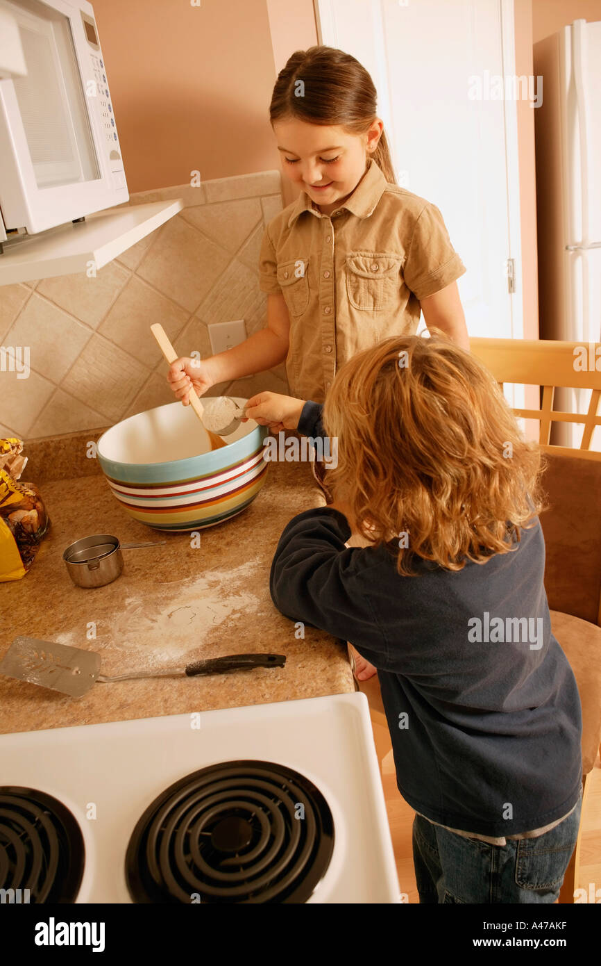 Children in the kitchen Stock Photo - Alamy