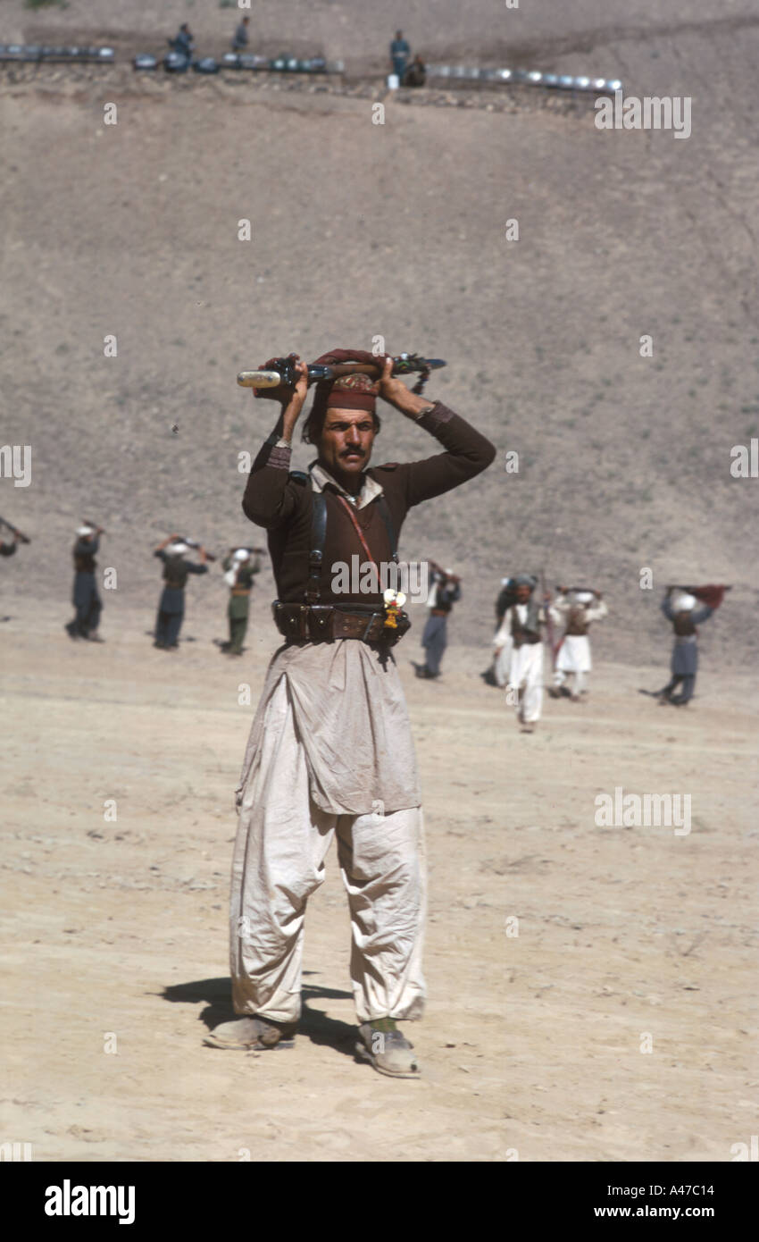 Pushtun man dancing and singing at Jeshn Festival Bamiyan Afghanistan ...