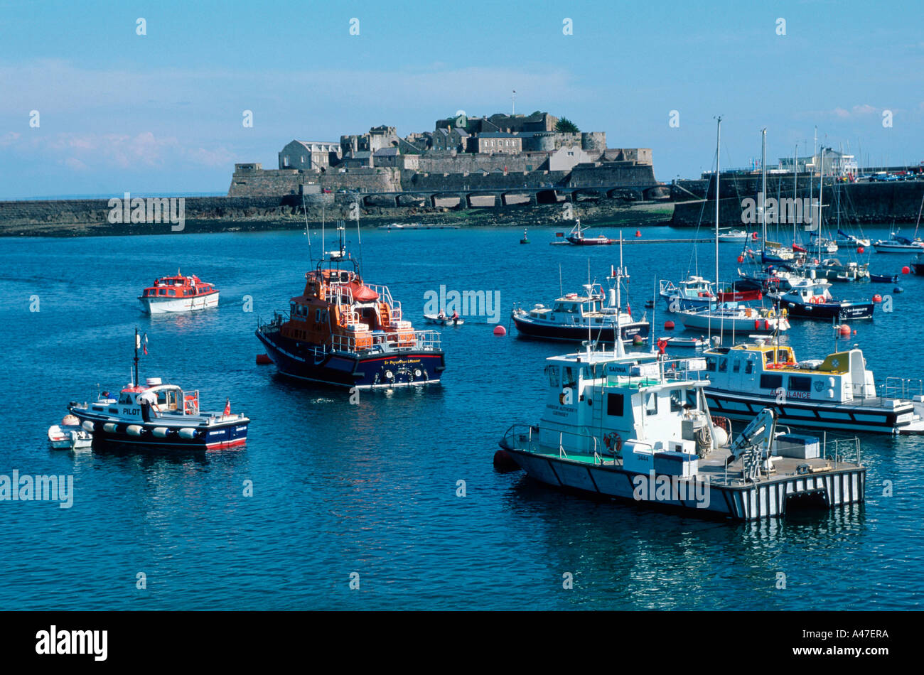 Boats in harbour St. Peter Port Stock Photo - Alamy