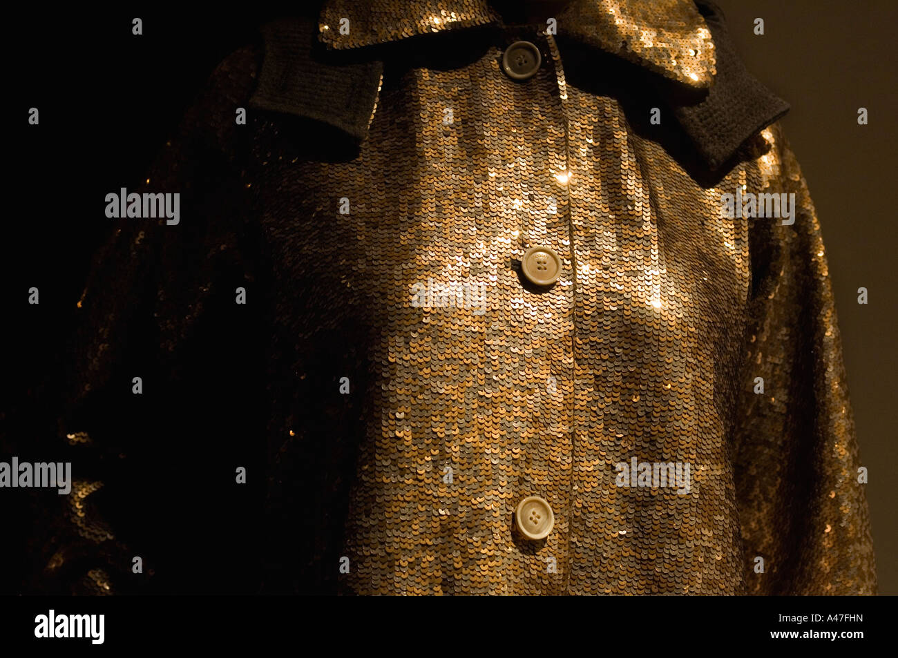 Store window mannequin wearing a Max Mira poncho buttoned coat made of ...