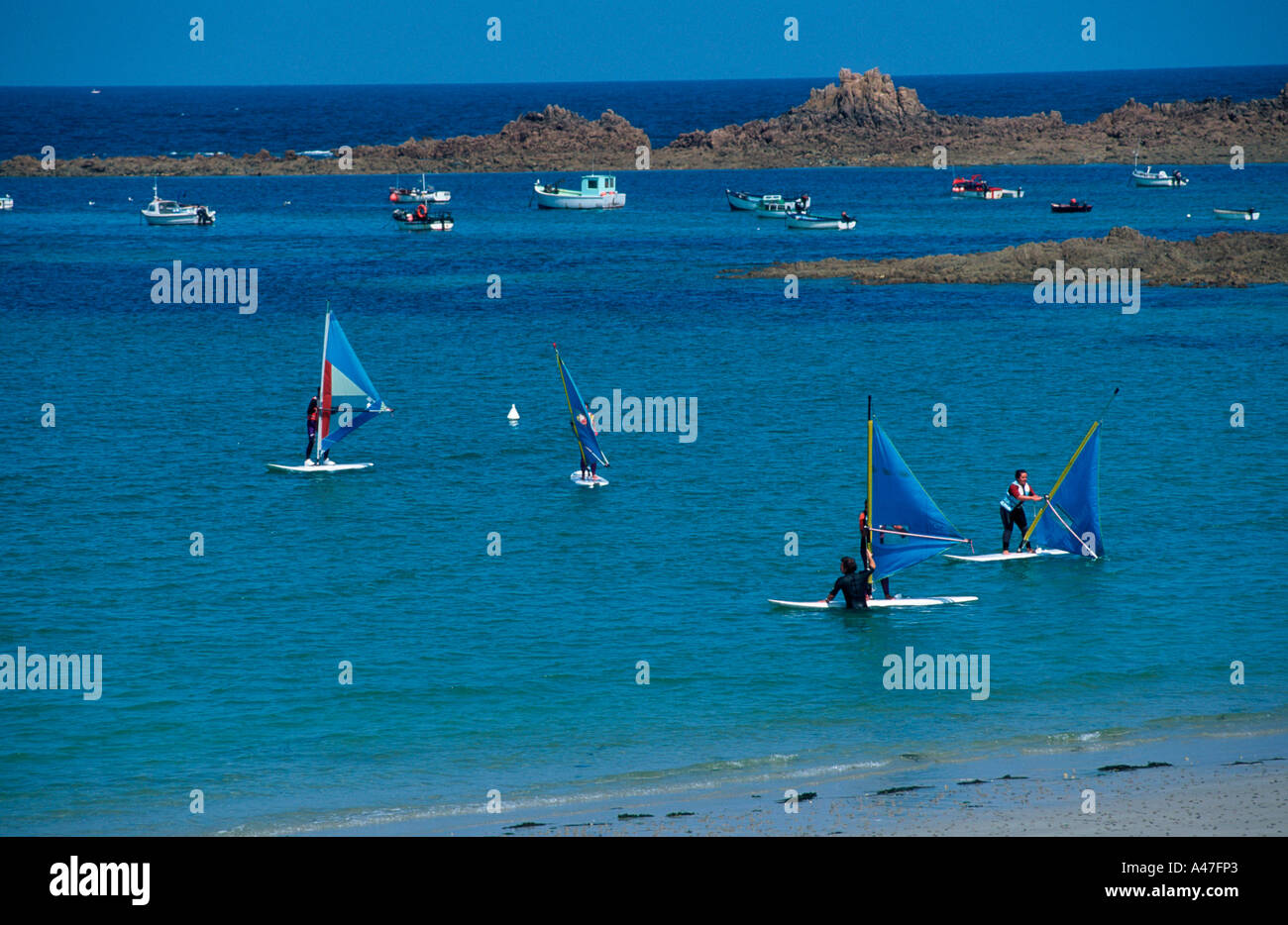 Surfer Cobo Bay Stock Photo - Alamy